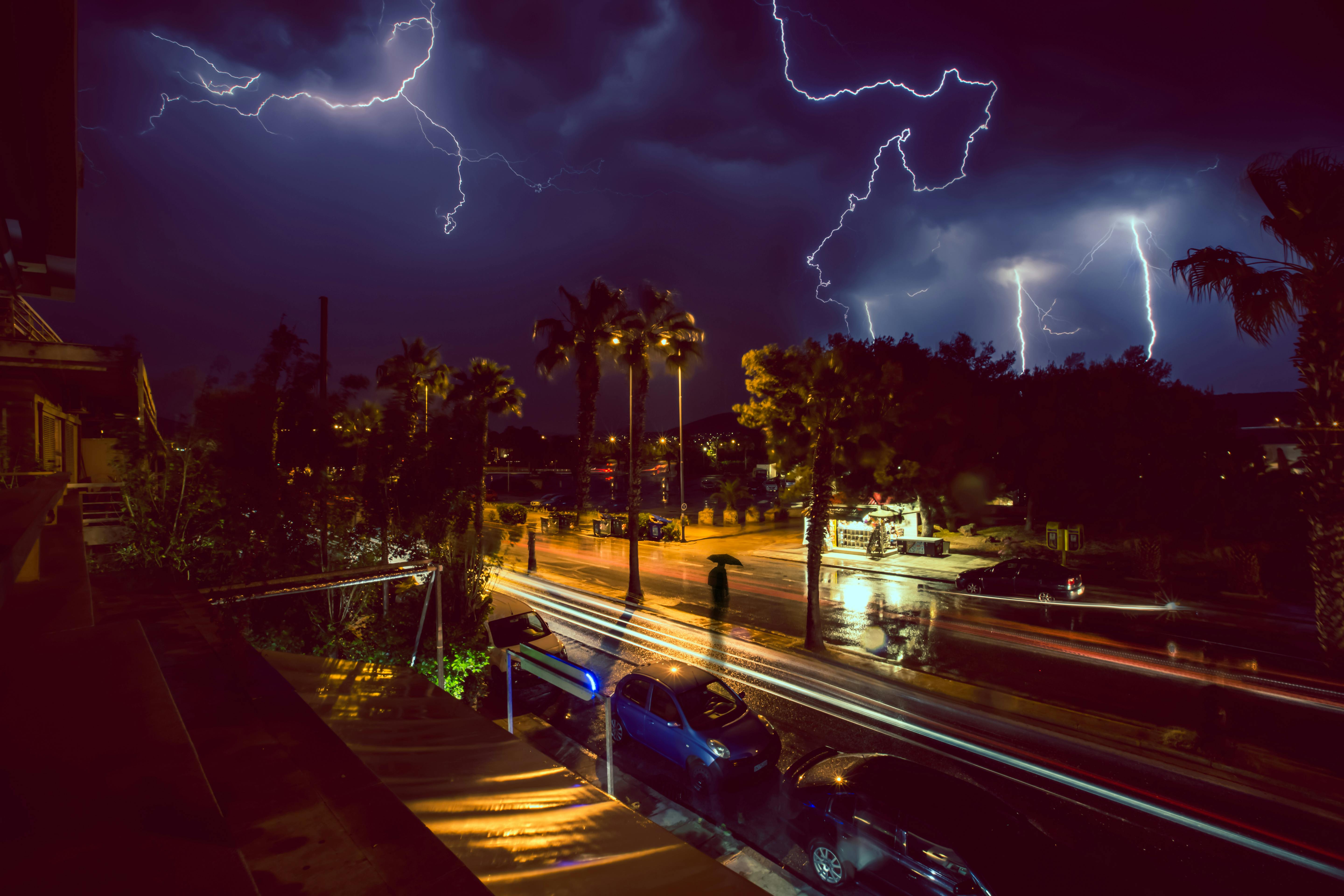 Storm with Lightnings over City Street at Night · Free Stock Photo