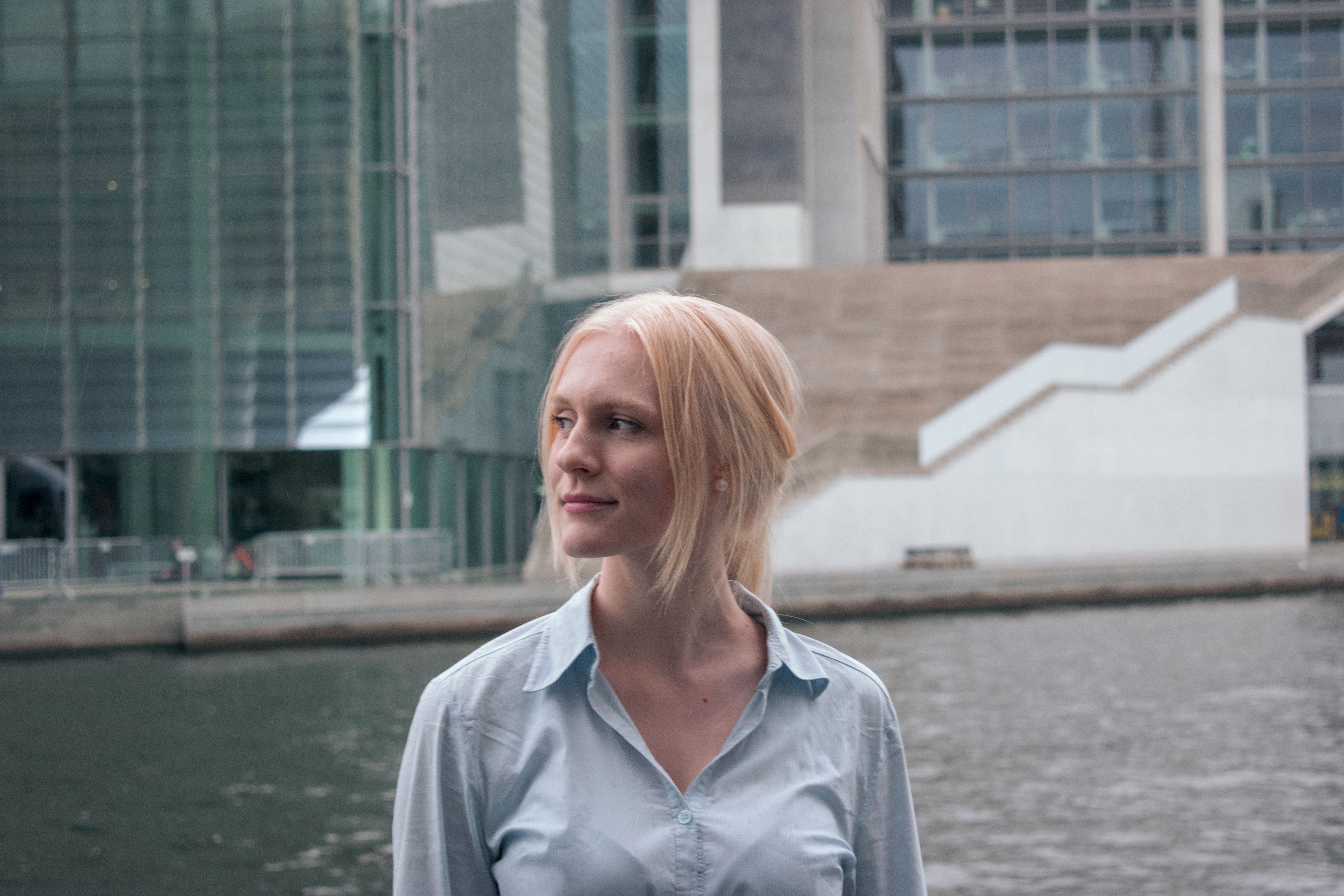 Woman Wearing Blazer with Her Hand on Her Chin · Free Stock Photo