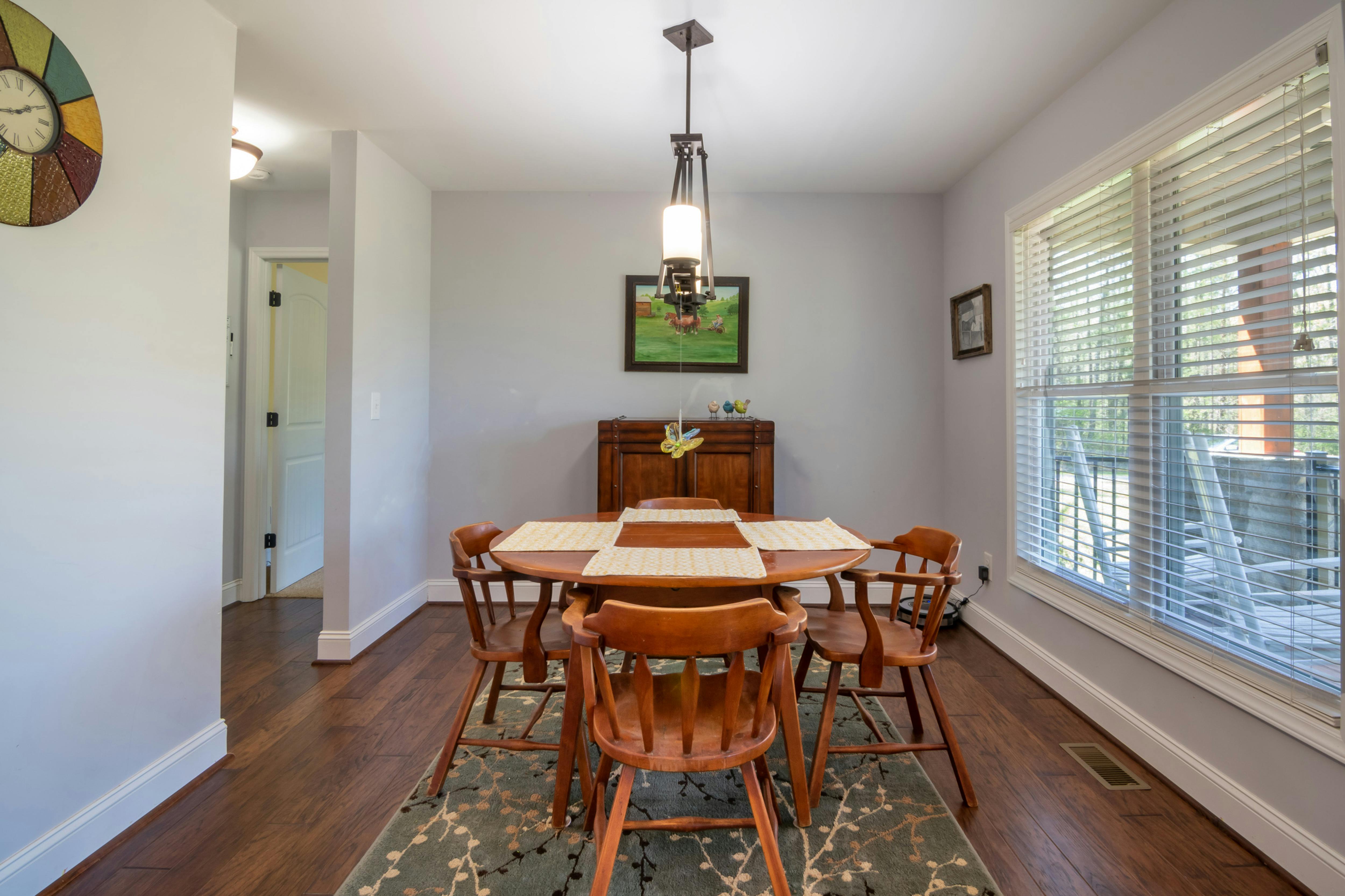Wooden Table and Chairs in a Dining Room · Free Stock Photo