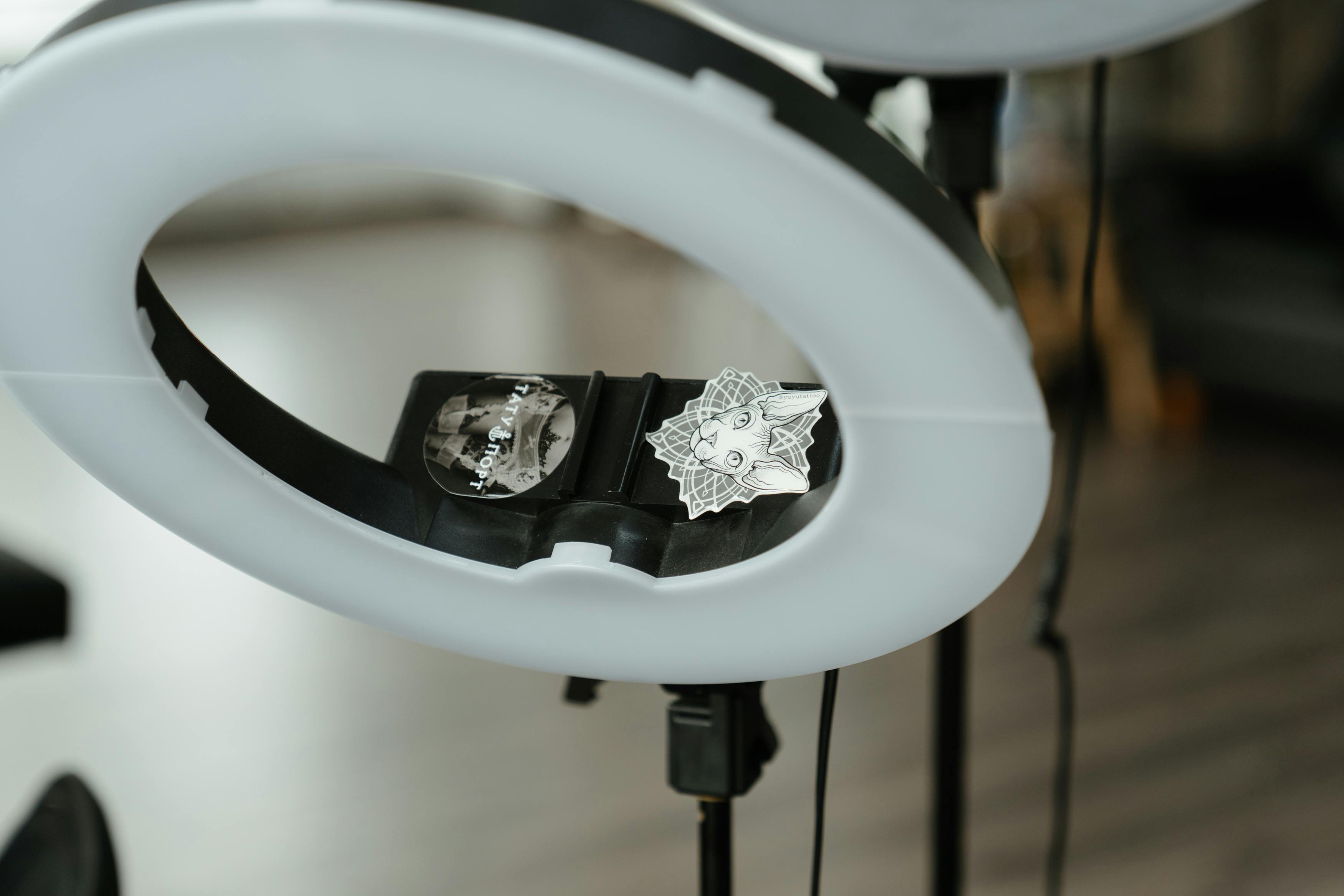 Silver and Gold Ring on White Round Table · Free Stock Photo