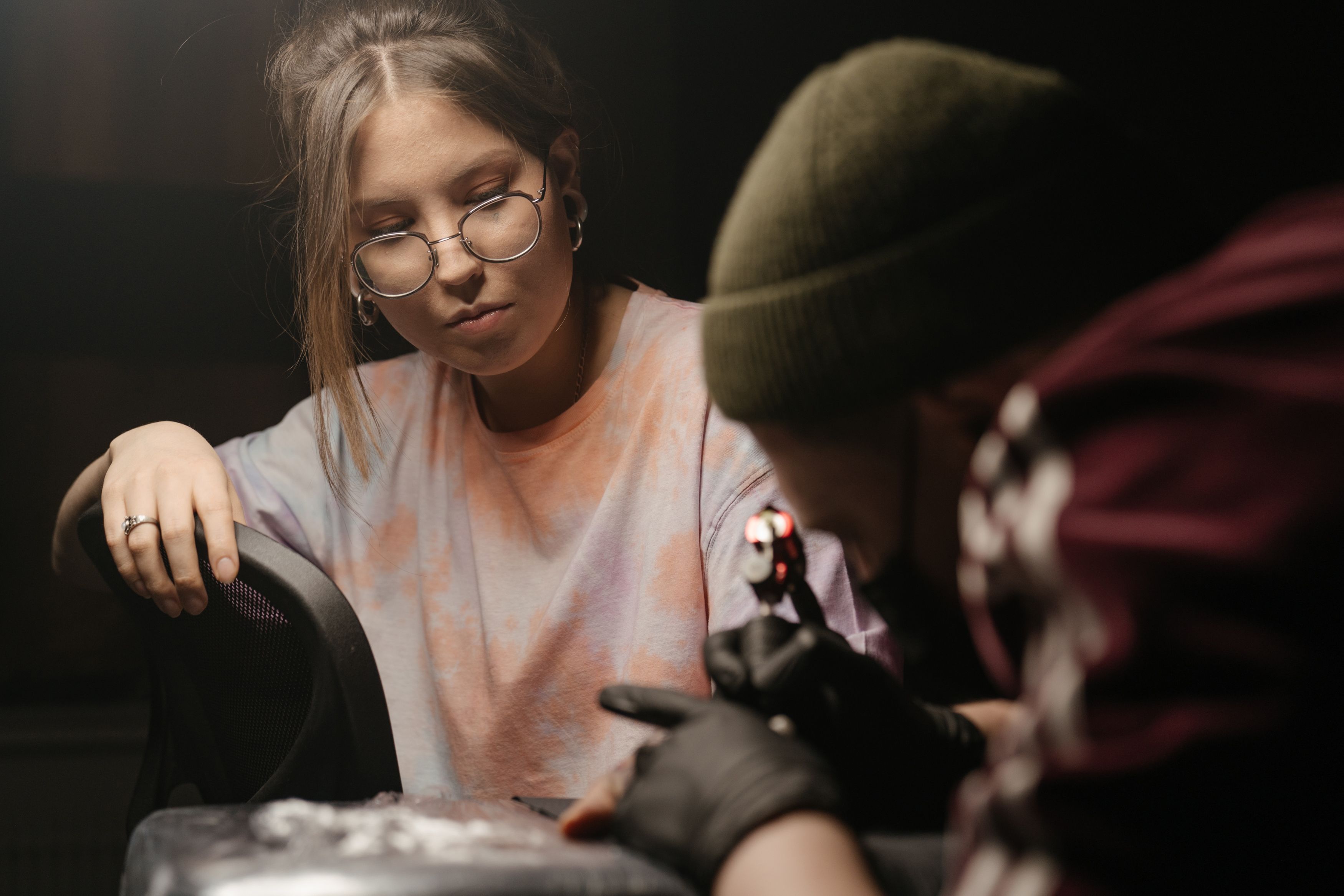 A Person Getting an Arm Tattoo · Free Stock Photo