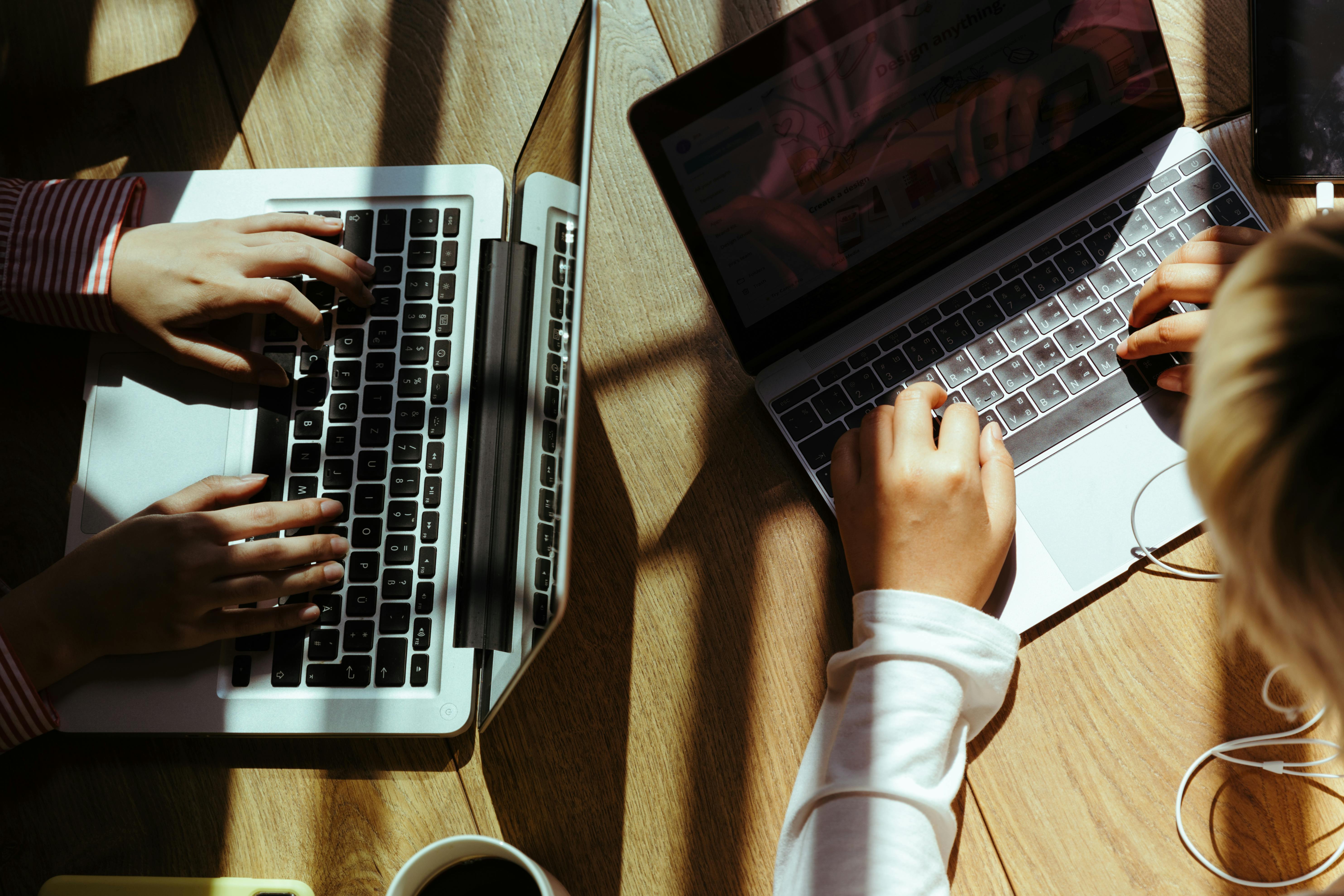 Crop women typing on laptop keyboard · Free Stock Photo