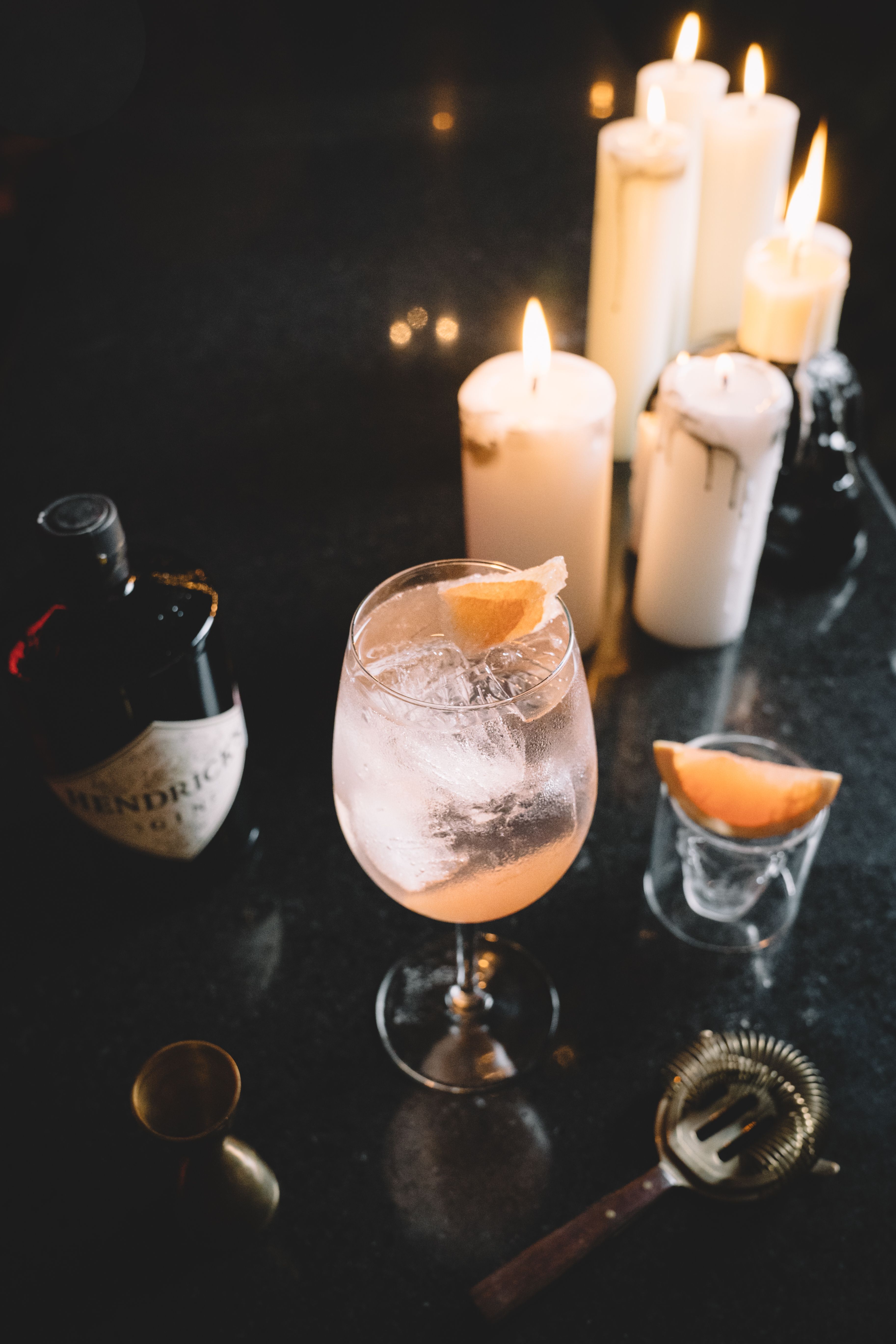Lighted Candles Beside Alcoholic Beverage · Free Stock Photo