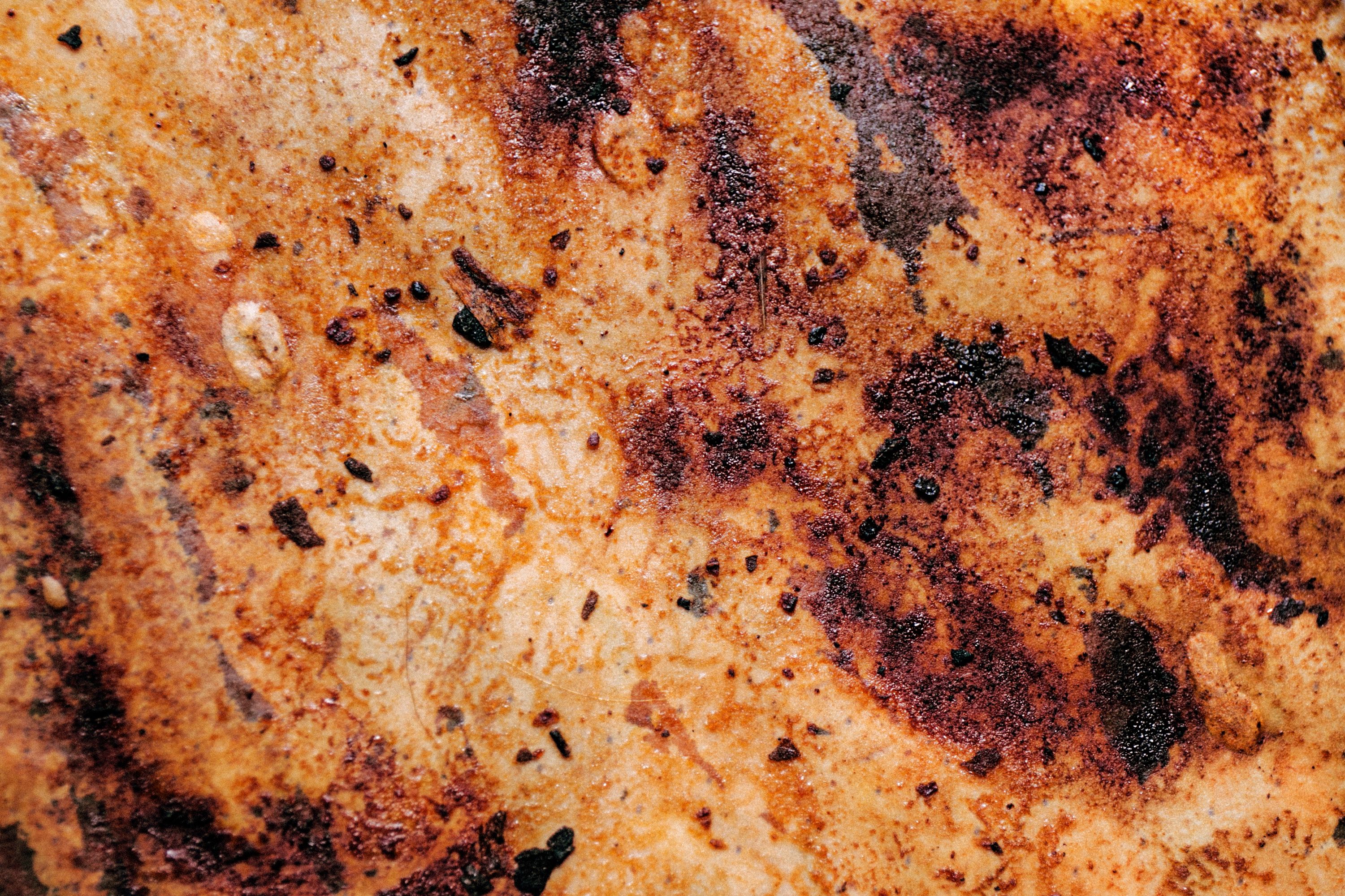 A Rusty Metal Surface with Paint Peeling Off · Free Stock Photo