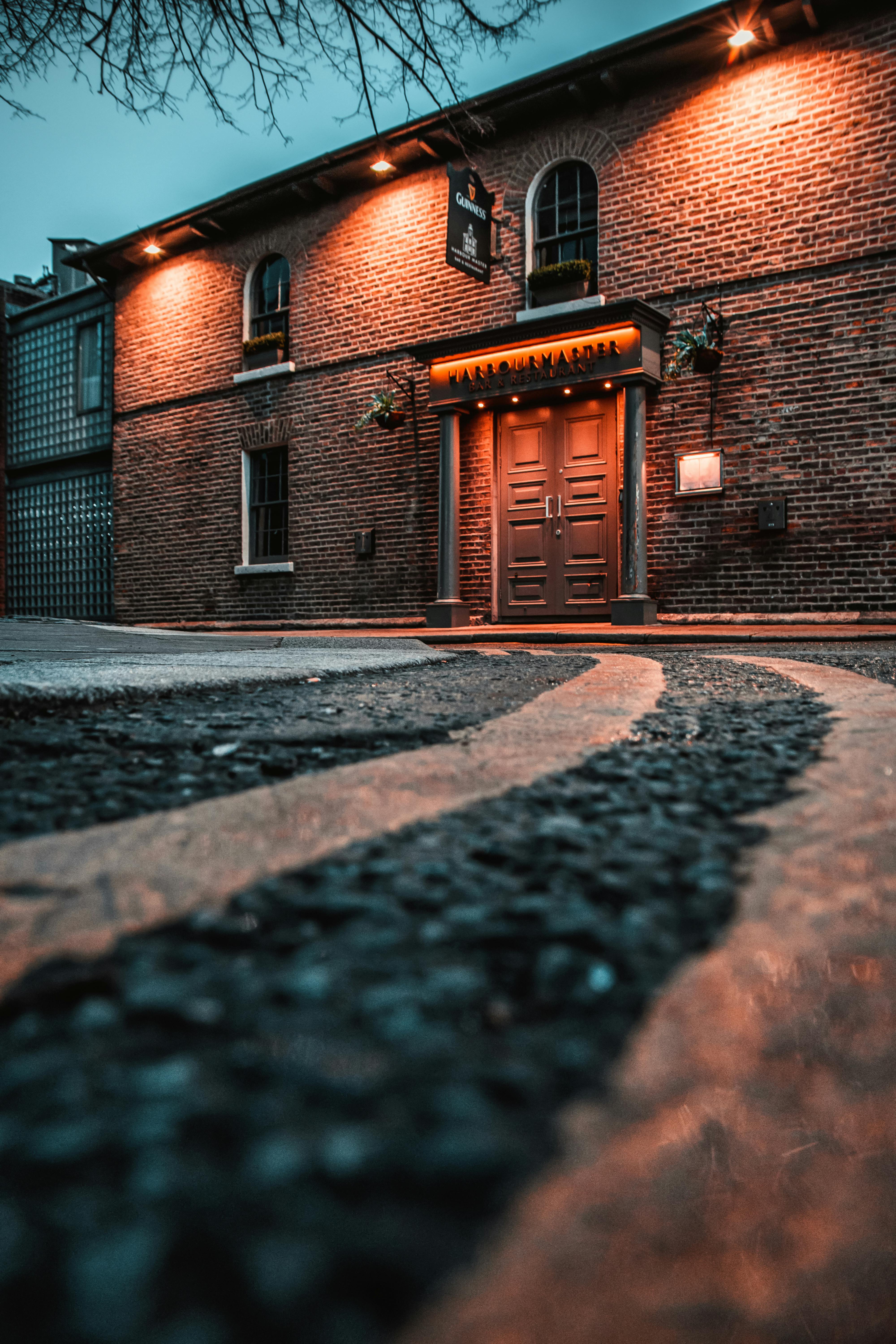 Brick Building During Night Time · Free Stock Photo