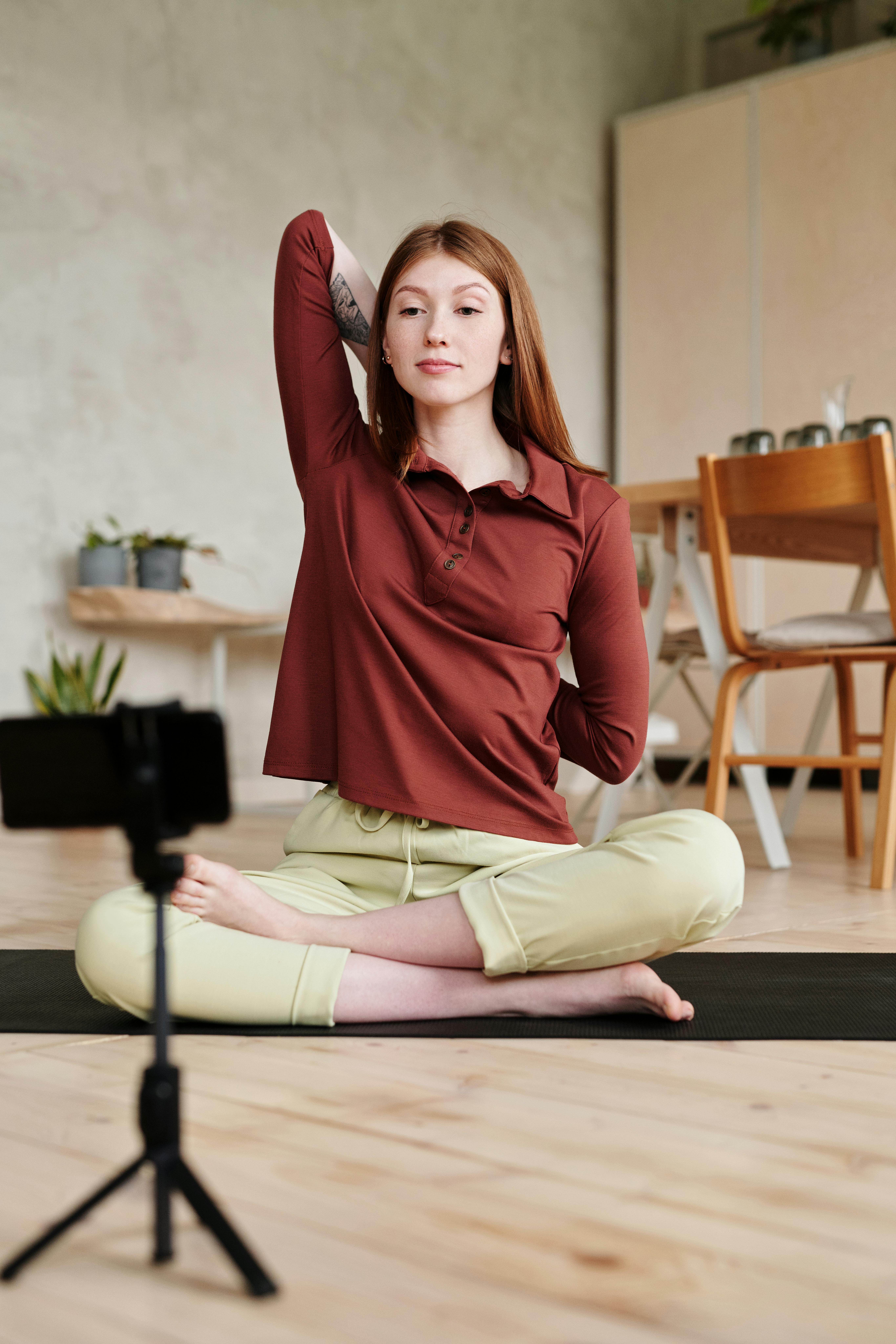 Woman Doing Yoga at Home while Vlogging · Free Stock Photo