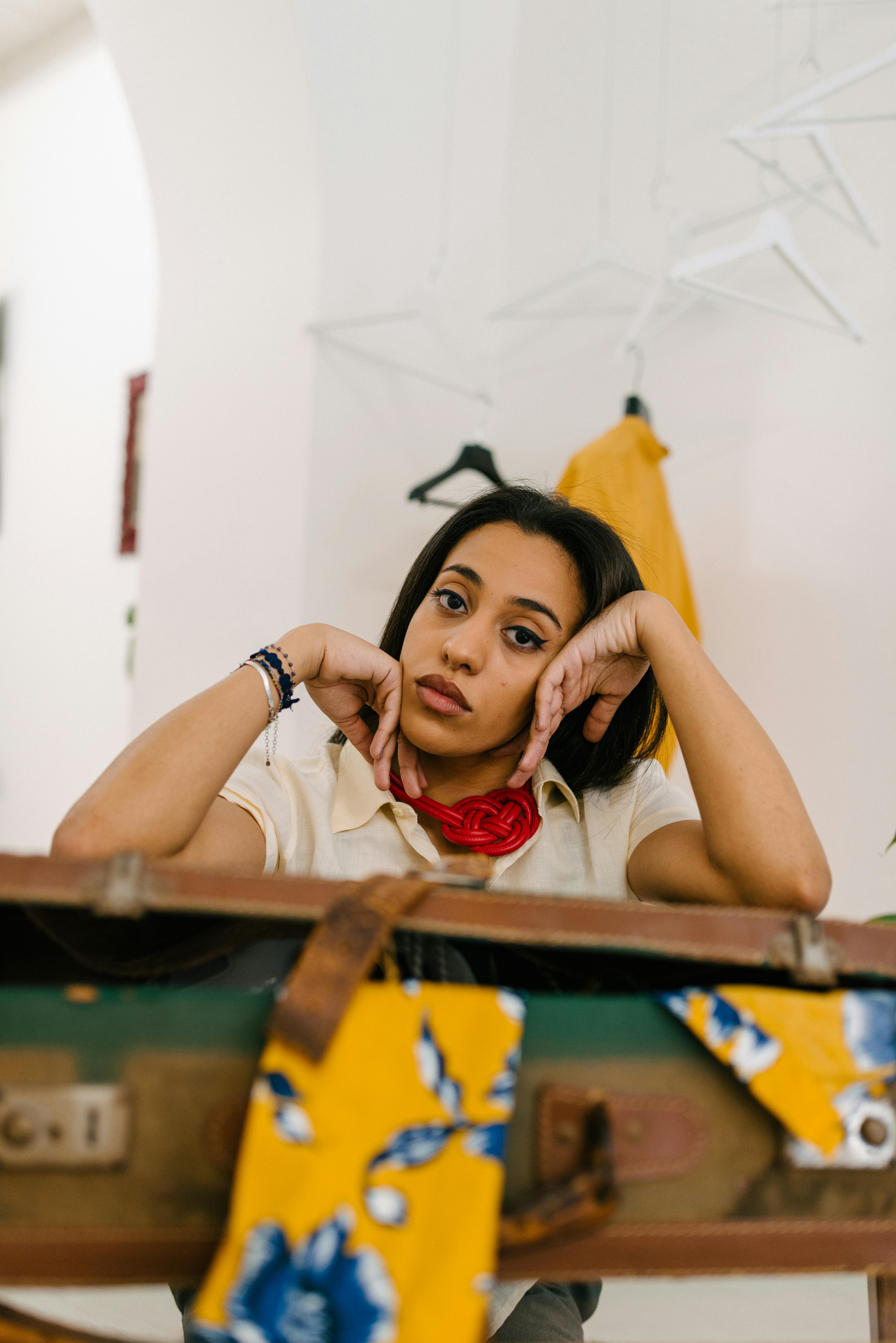 A Woman Leaning on Table · Free Stock Photo