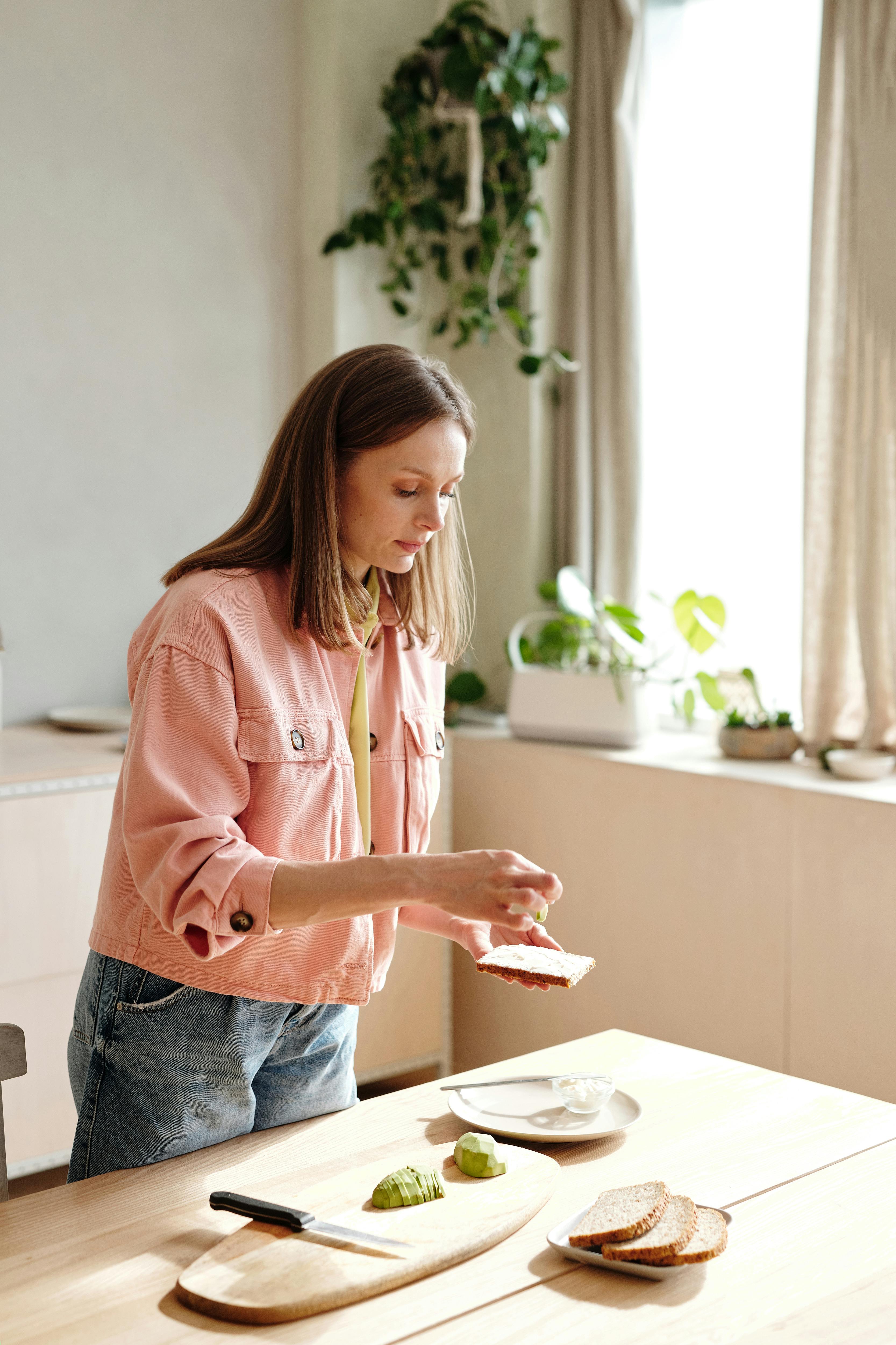 A Woman Preparing Snack in the Kitchen · Free Stock Photo