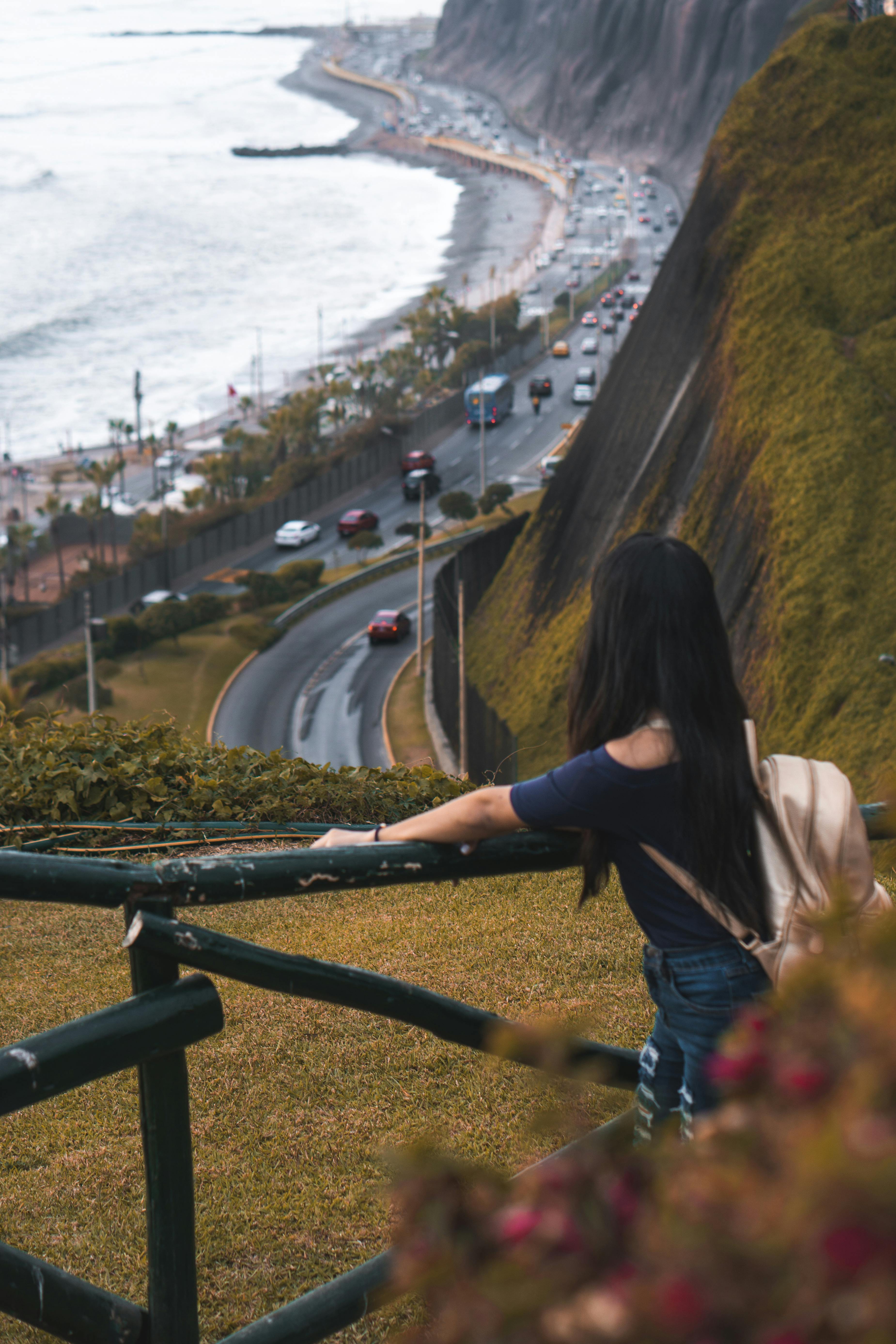 Woman Looking Over Road · Free Stock Photo