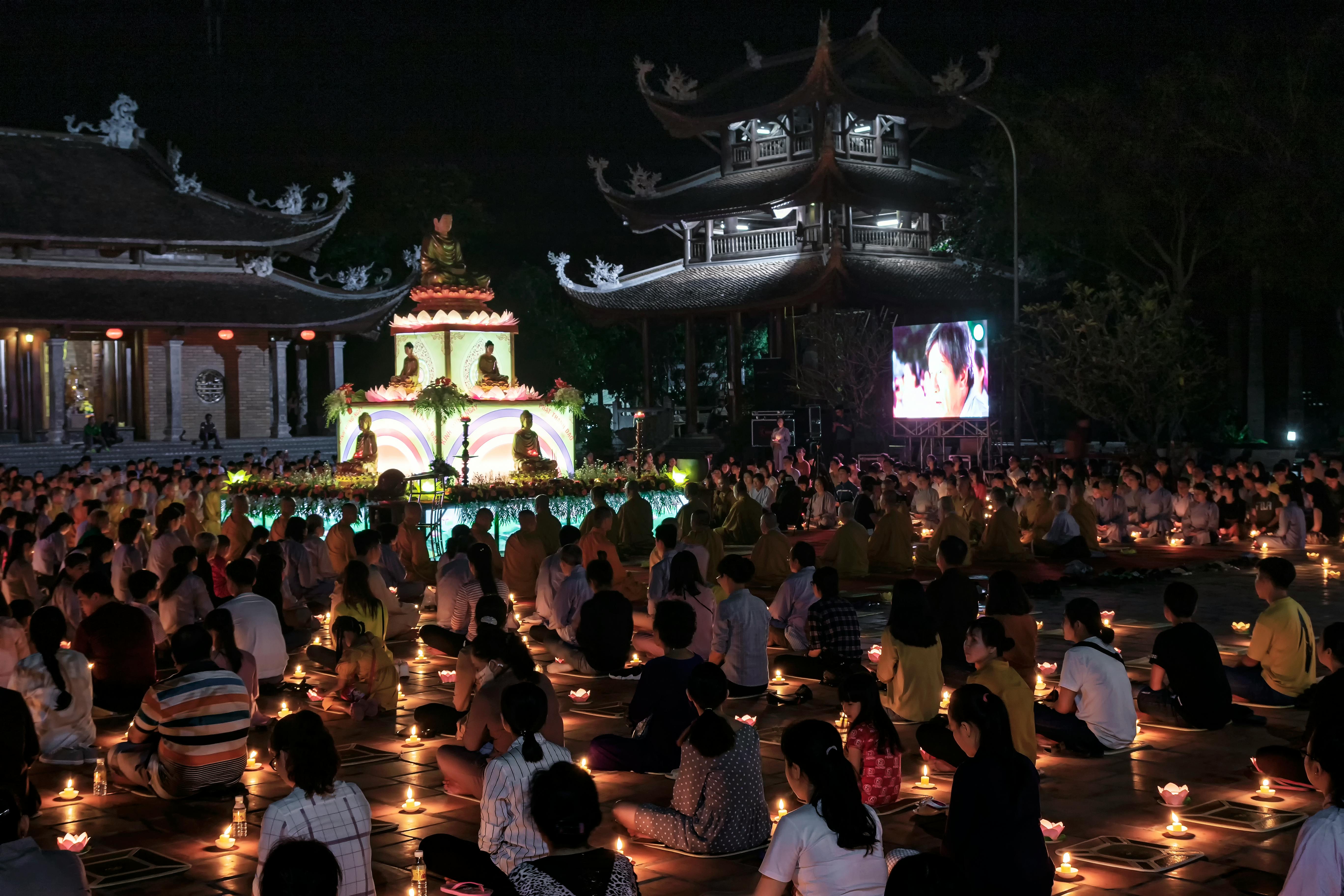 People Gathering Near the Temple during Night Time · Free Stock Photo