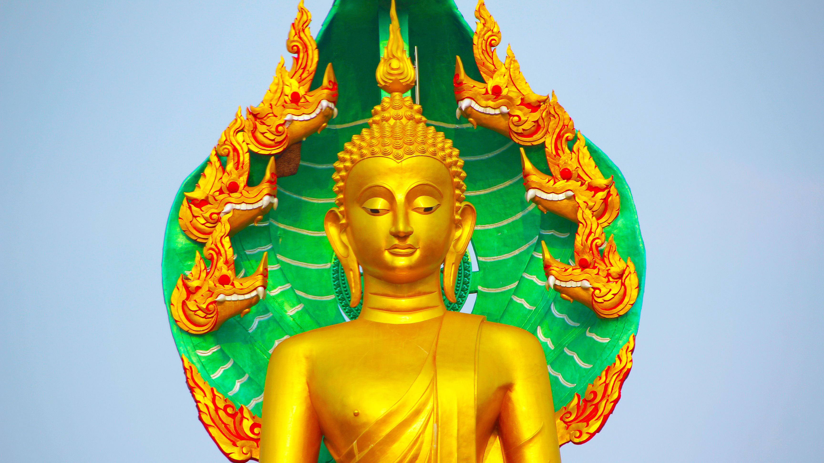 Composition of Buddha statues on marble stand · Free Stock Photo
