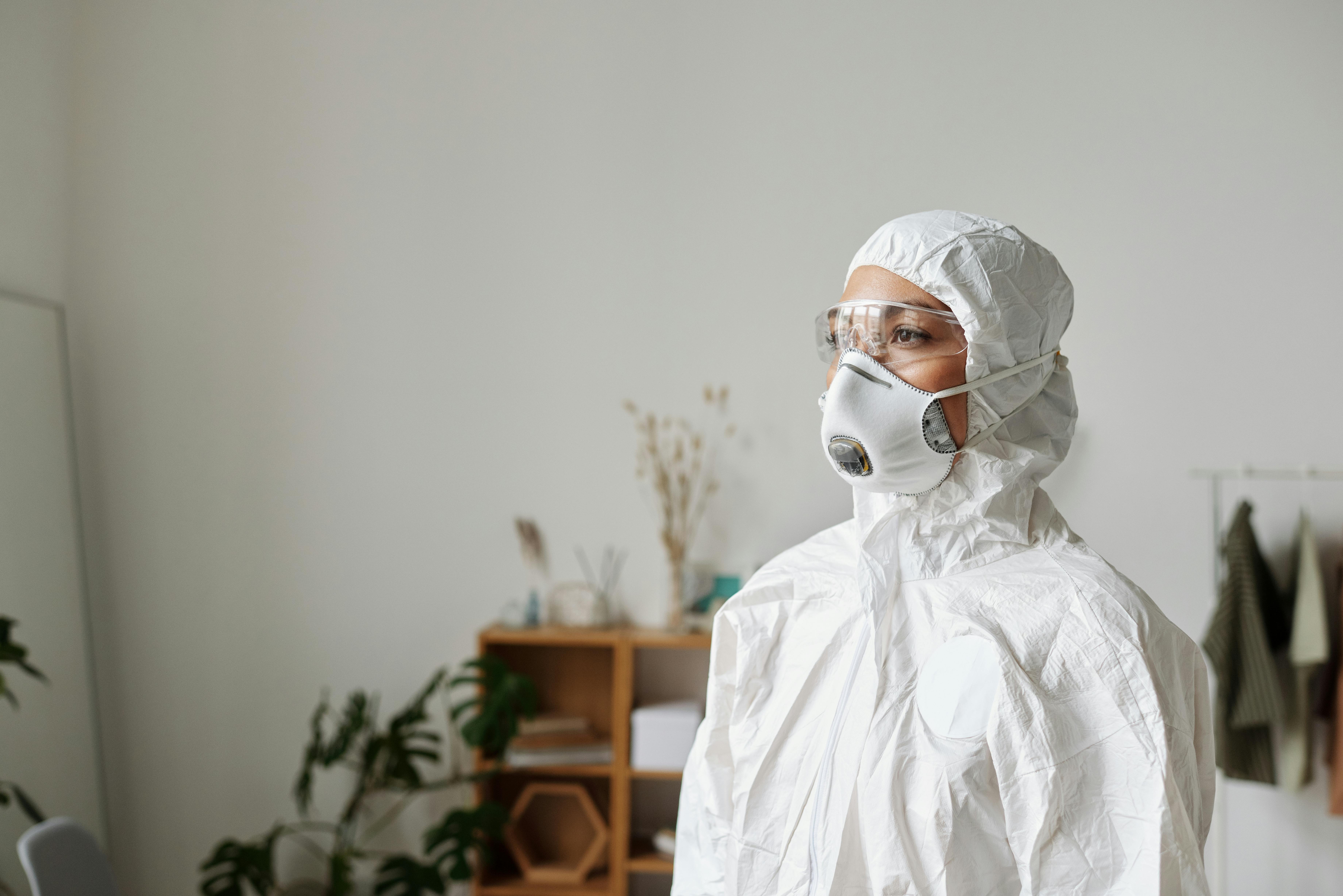 A Woman Wearing Personal Protective Equipment · Free Stock Photo
