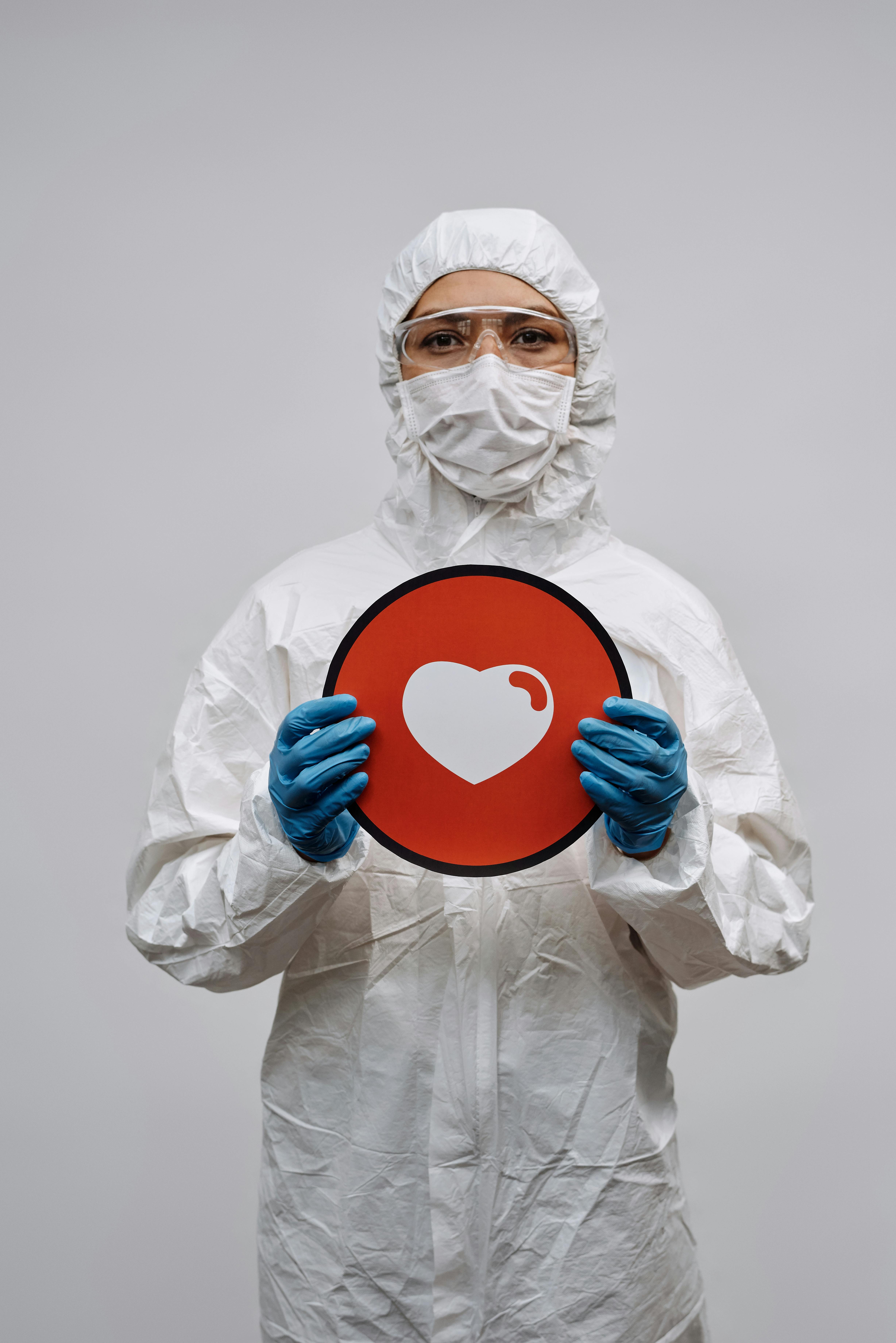 Person Wearing Protective Suit · Free Stock Photo