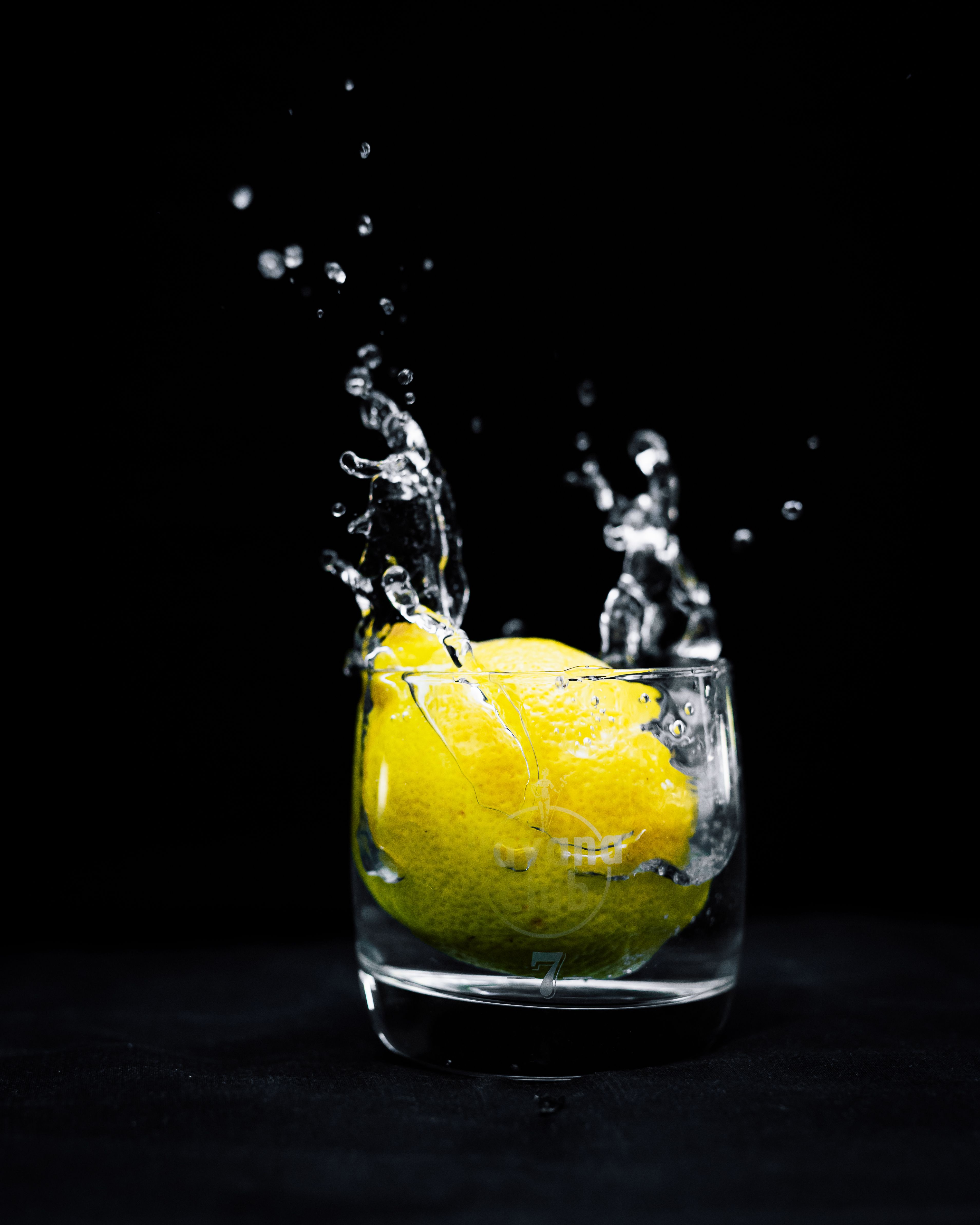 Clear Shot Glass With Tennis Ball · Free Stock Photo
