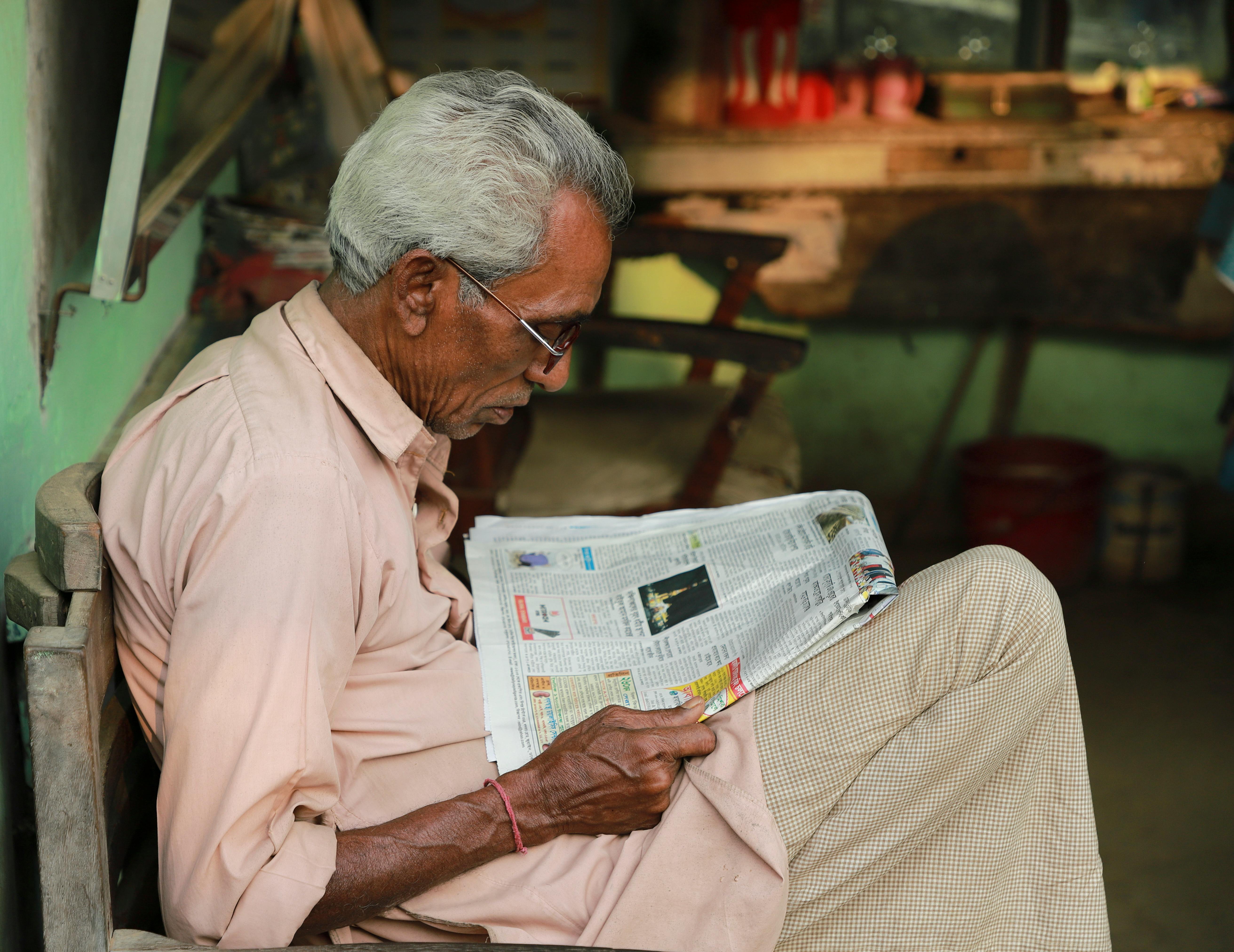 Old Man reading Newspaper · Free Stock Photo