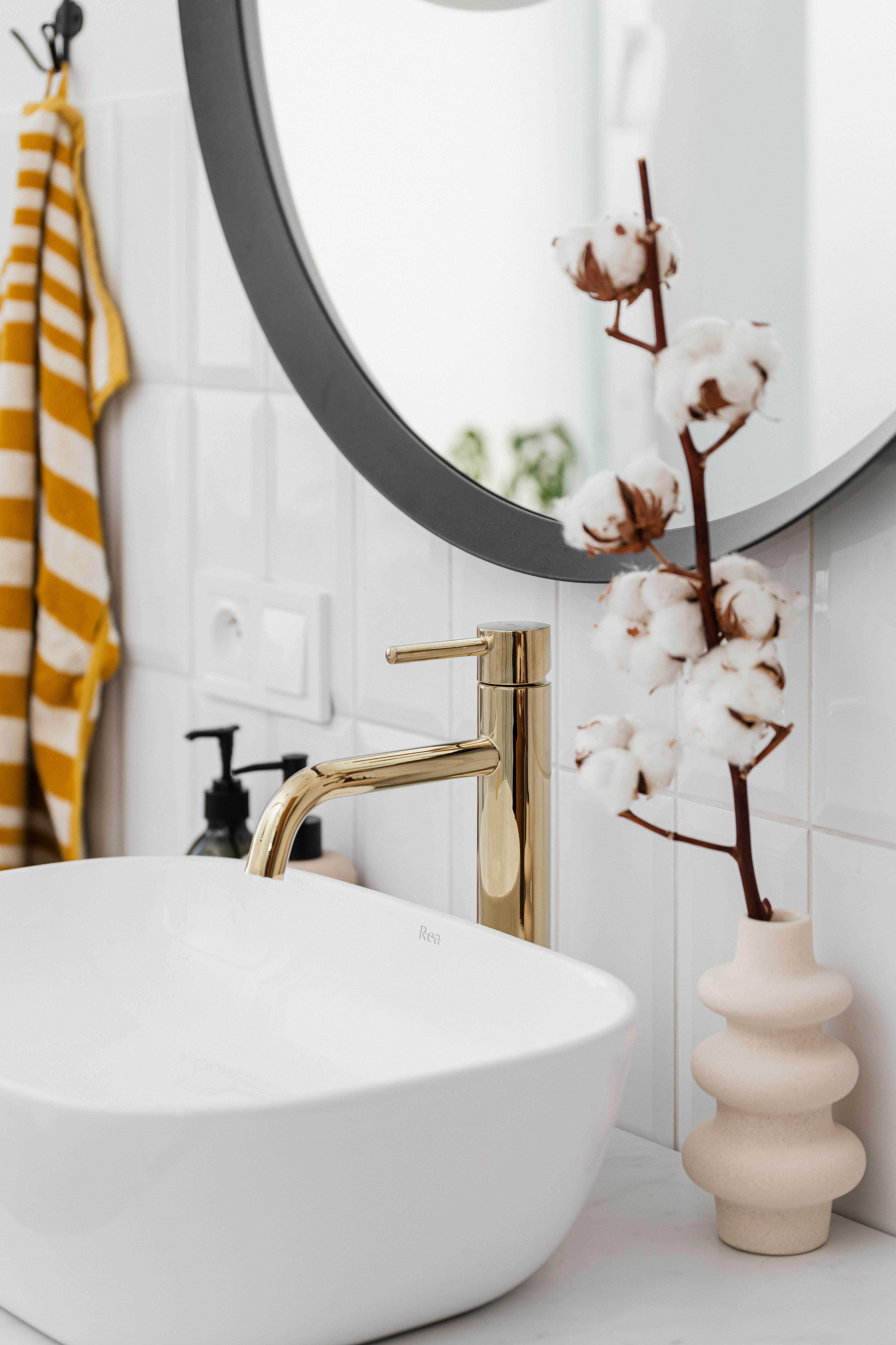 Faucet Below a Mirror · Free Stock Photo