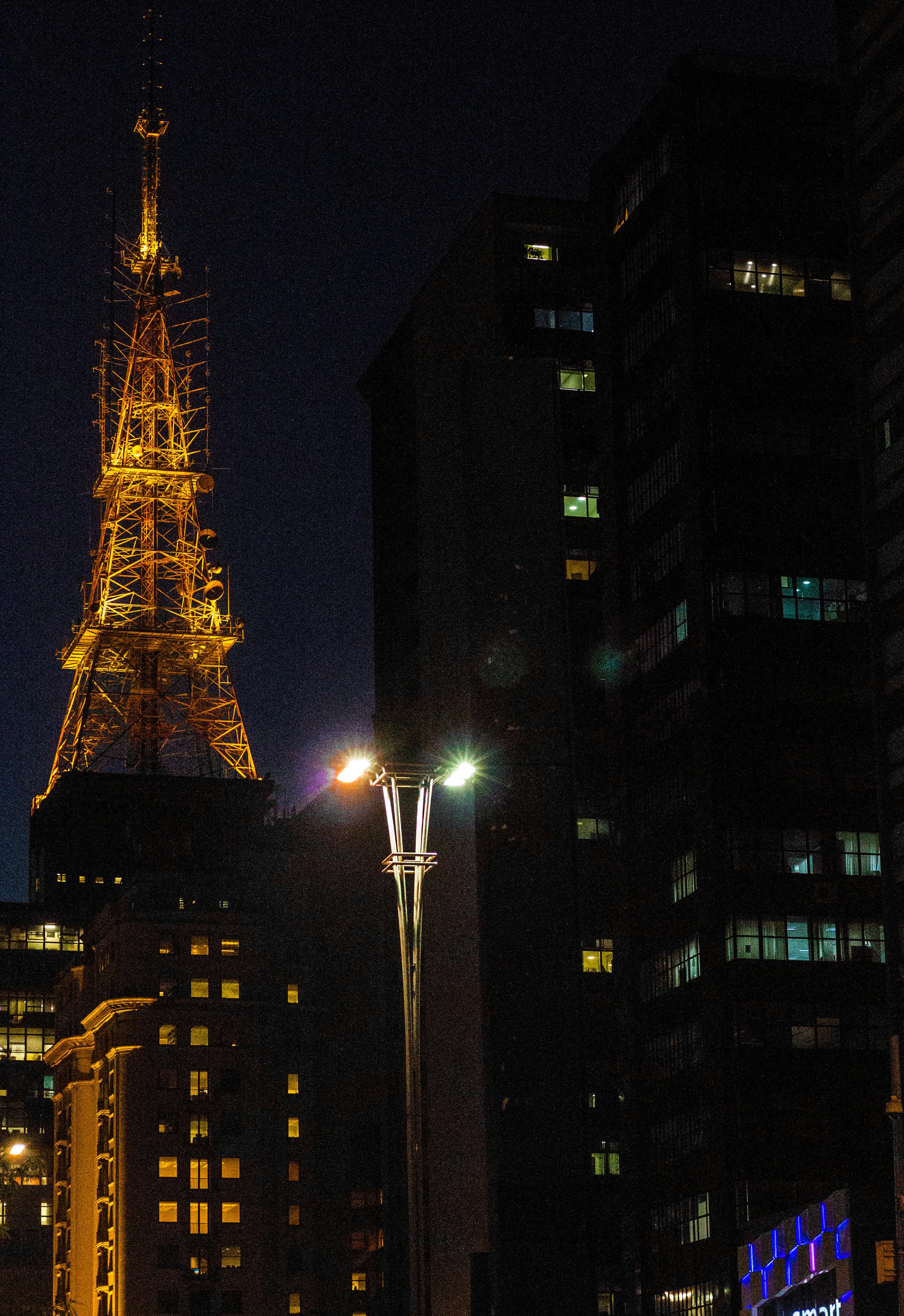 Lighted Tower in the City during Night Time · Free Stock Photo