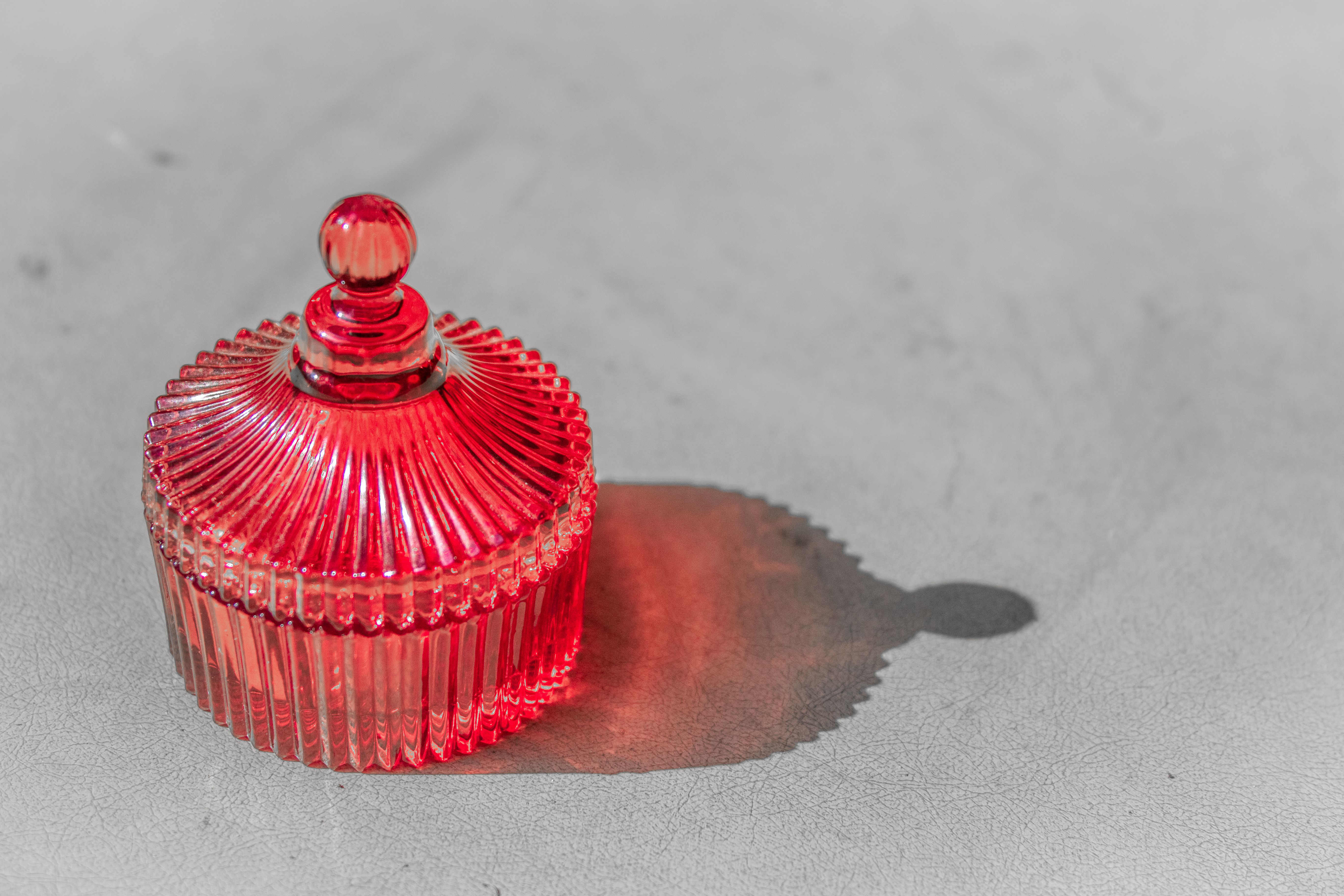 Red Glass Jar in Close Up Shot · Free Stock Photo