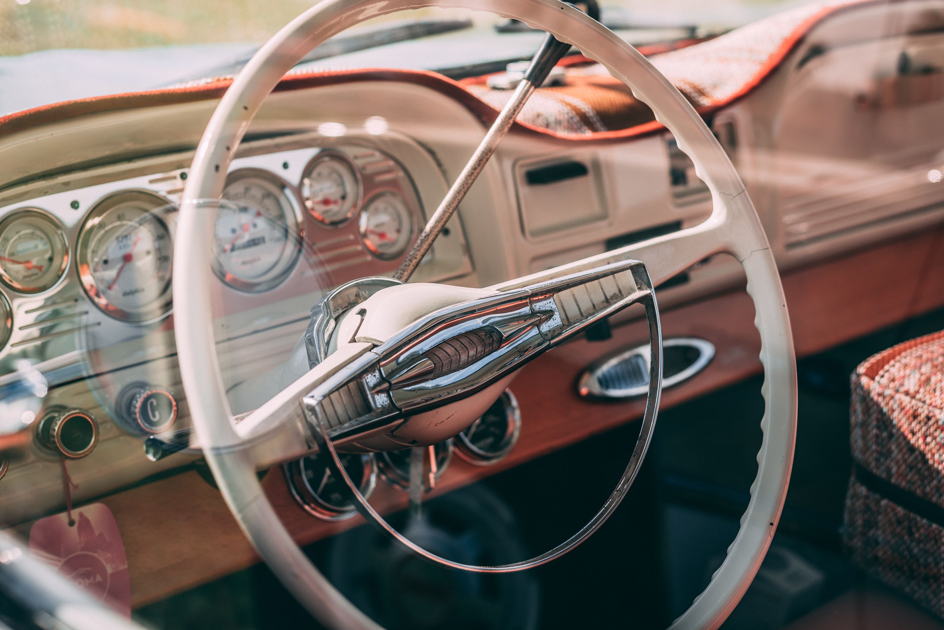 Exhibition of Car Interior with Magazines behind · Free Stock Photo