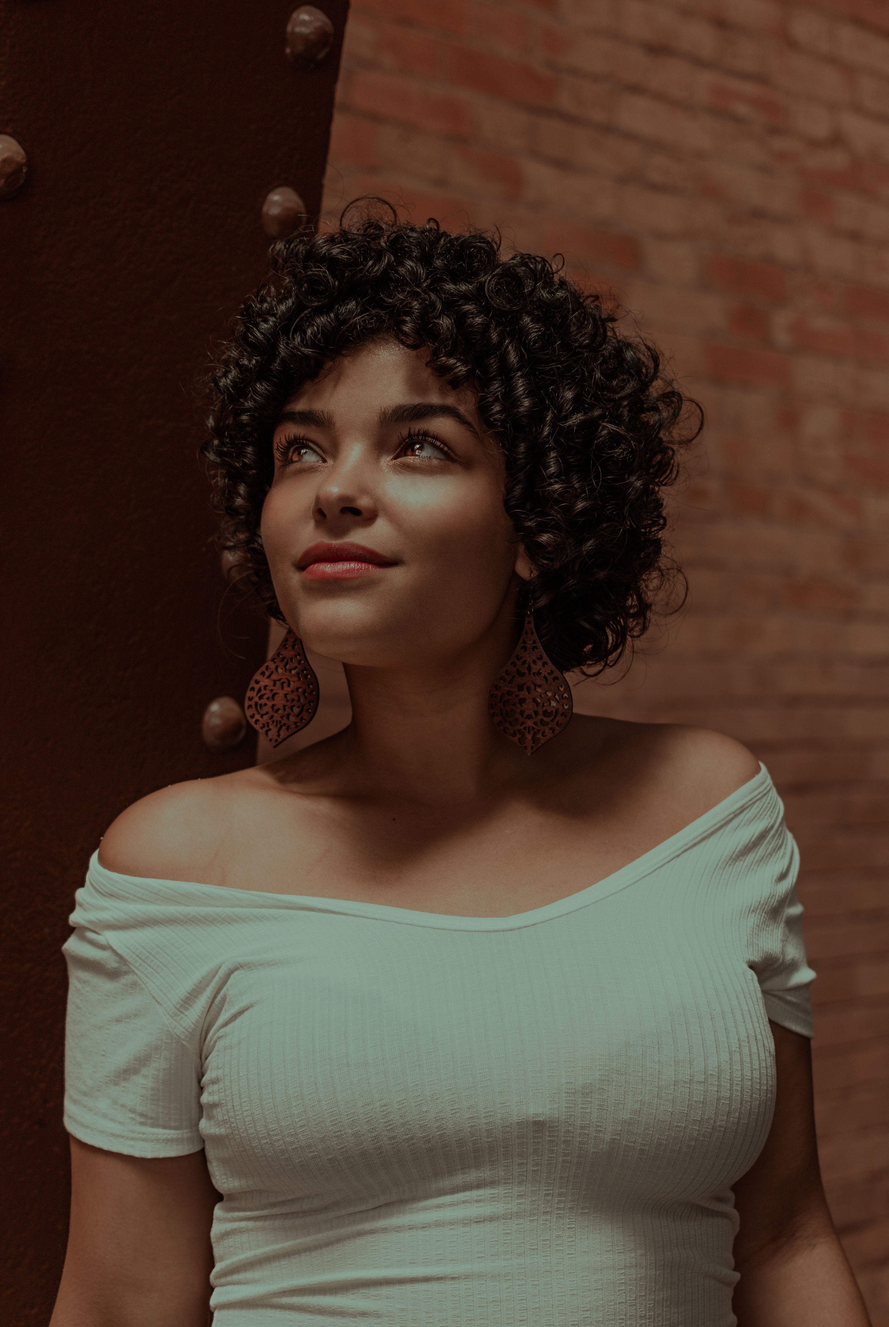 Woman Smiling at the Camera · Free Stock Photo