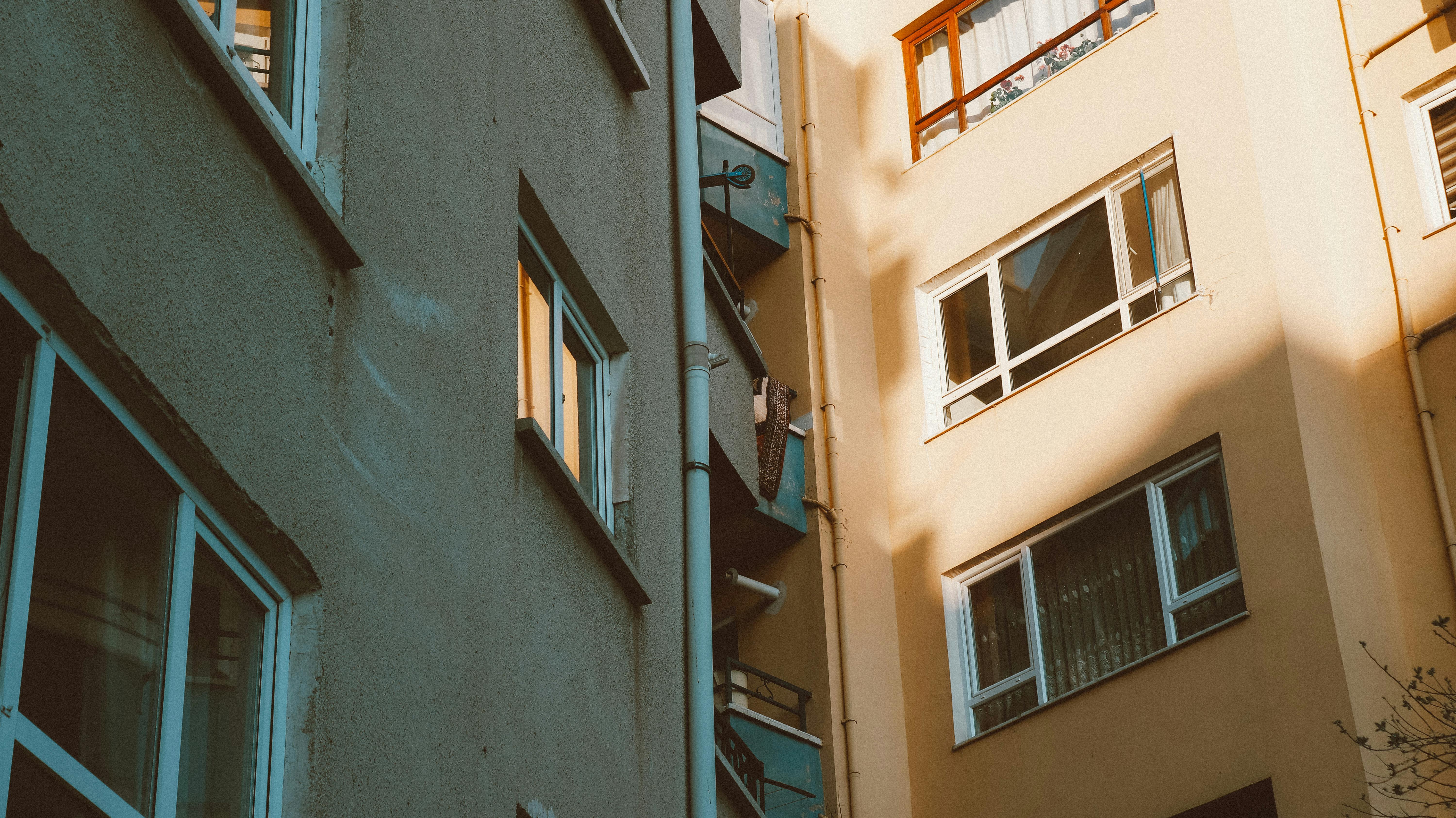 Windows of Apartment Buildings · Free Stock Photo