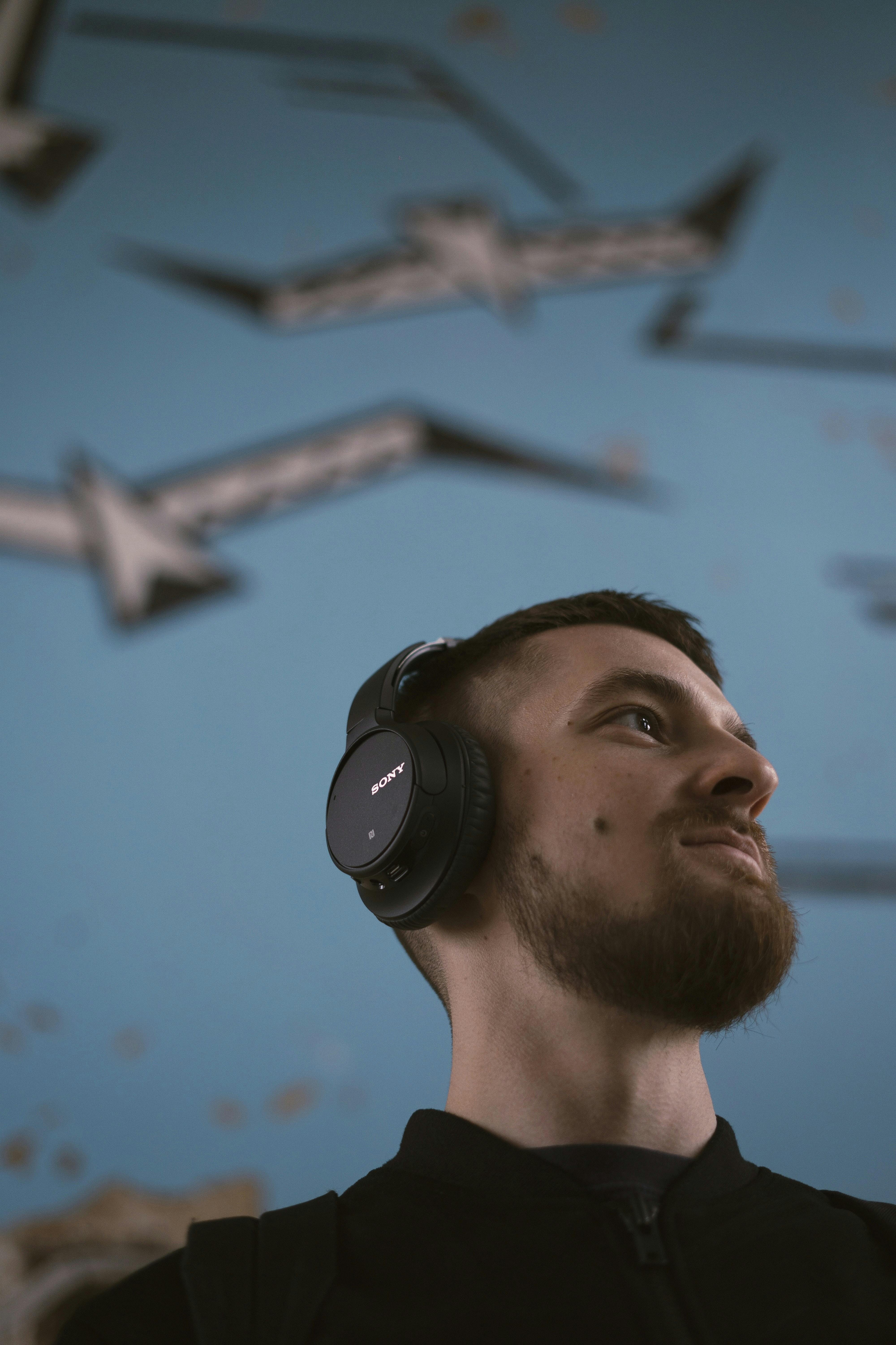 Man Wearing Black Headphones · Free Stock Photo
