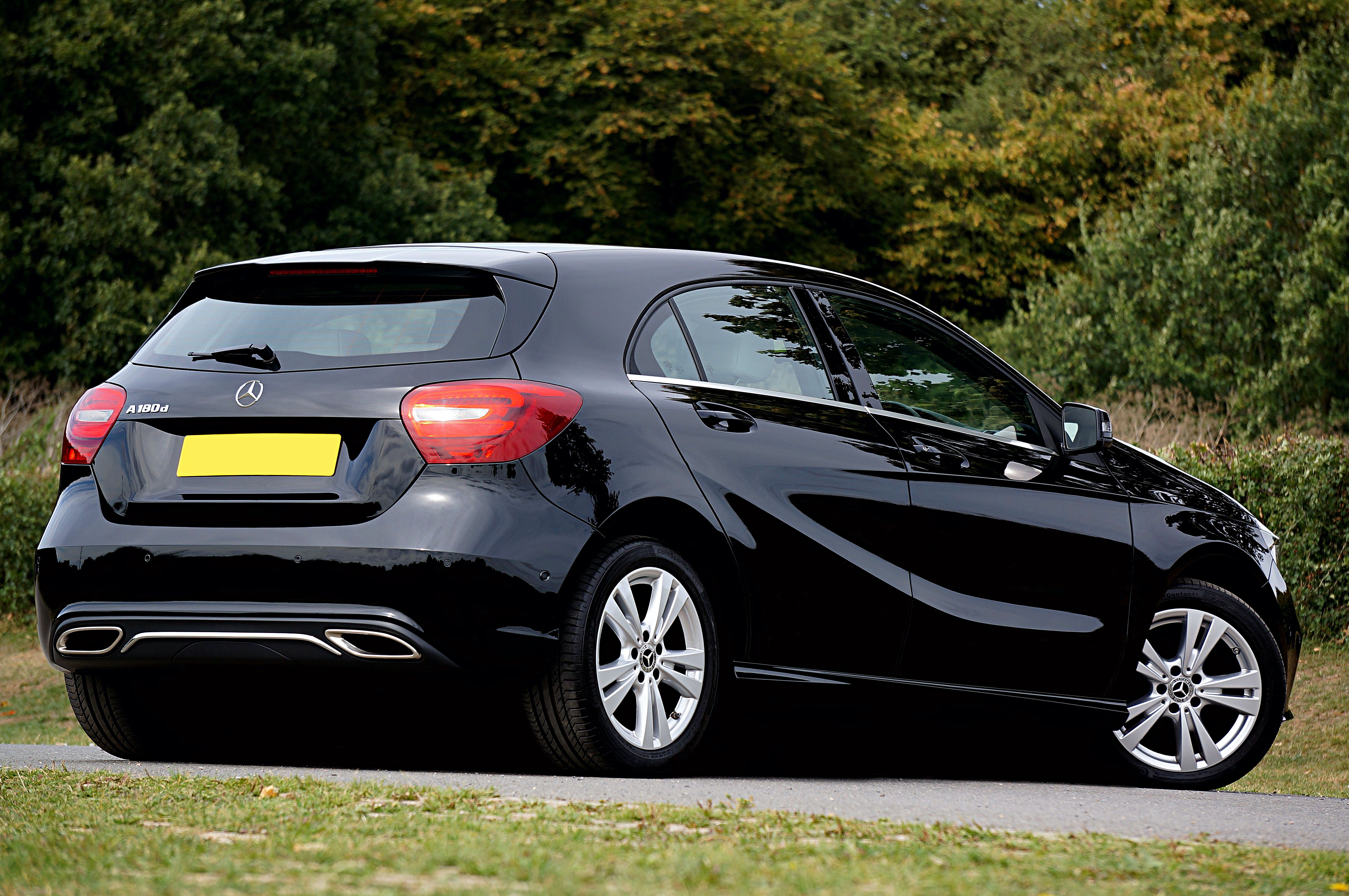 Photo of a White Hatchback Car · Free Stock Photo
