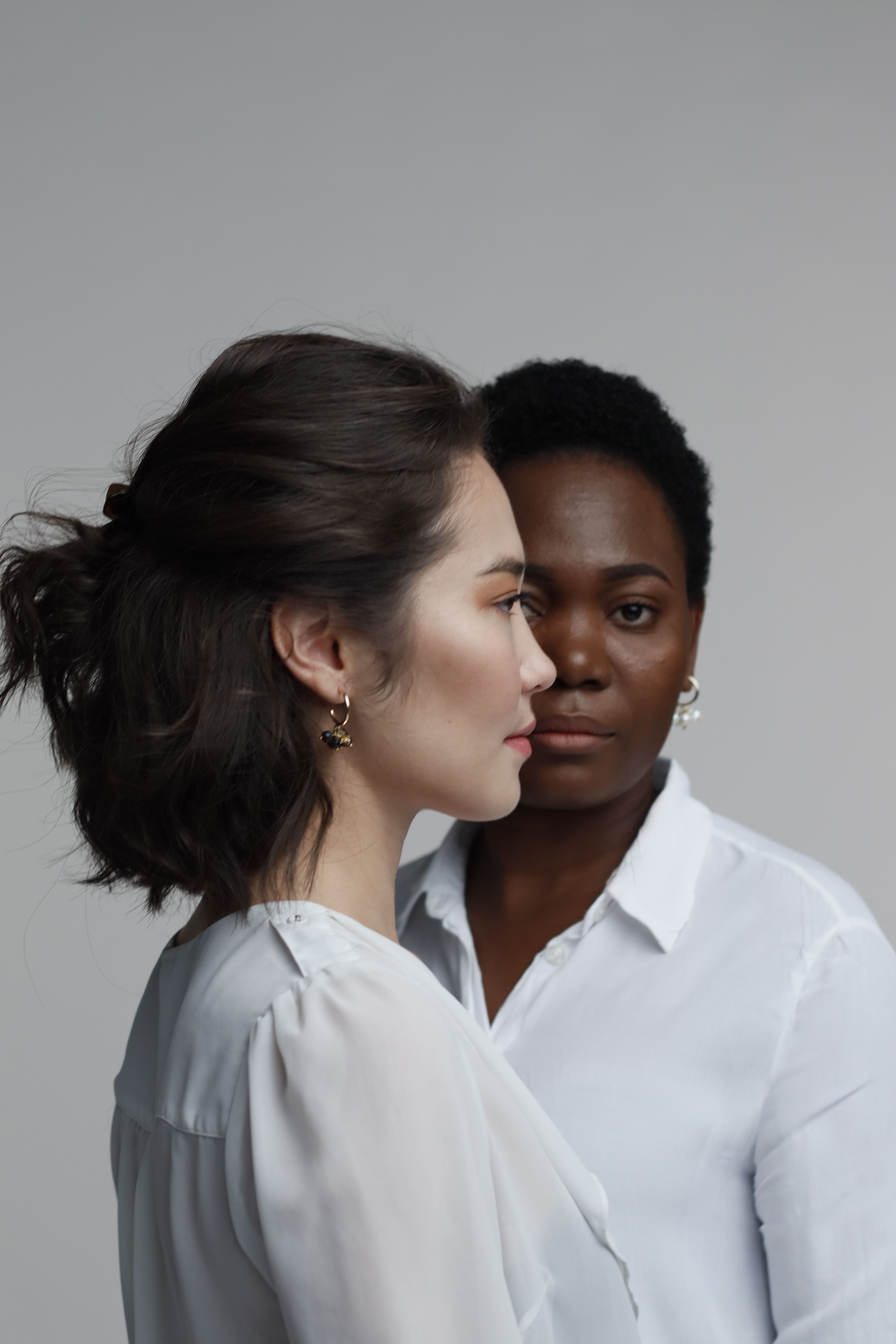 Women Wearing White Tops · Free Stock Photo