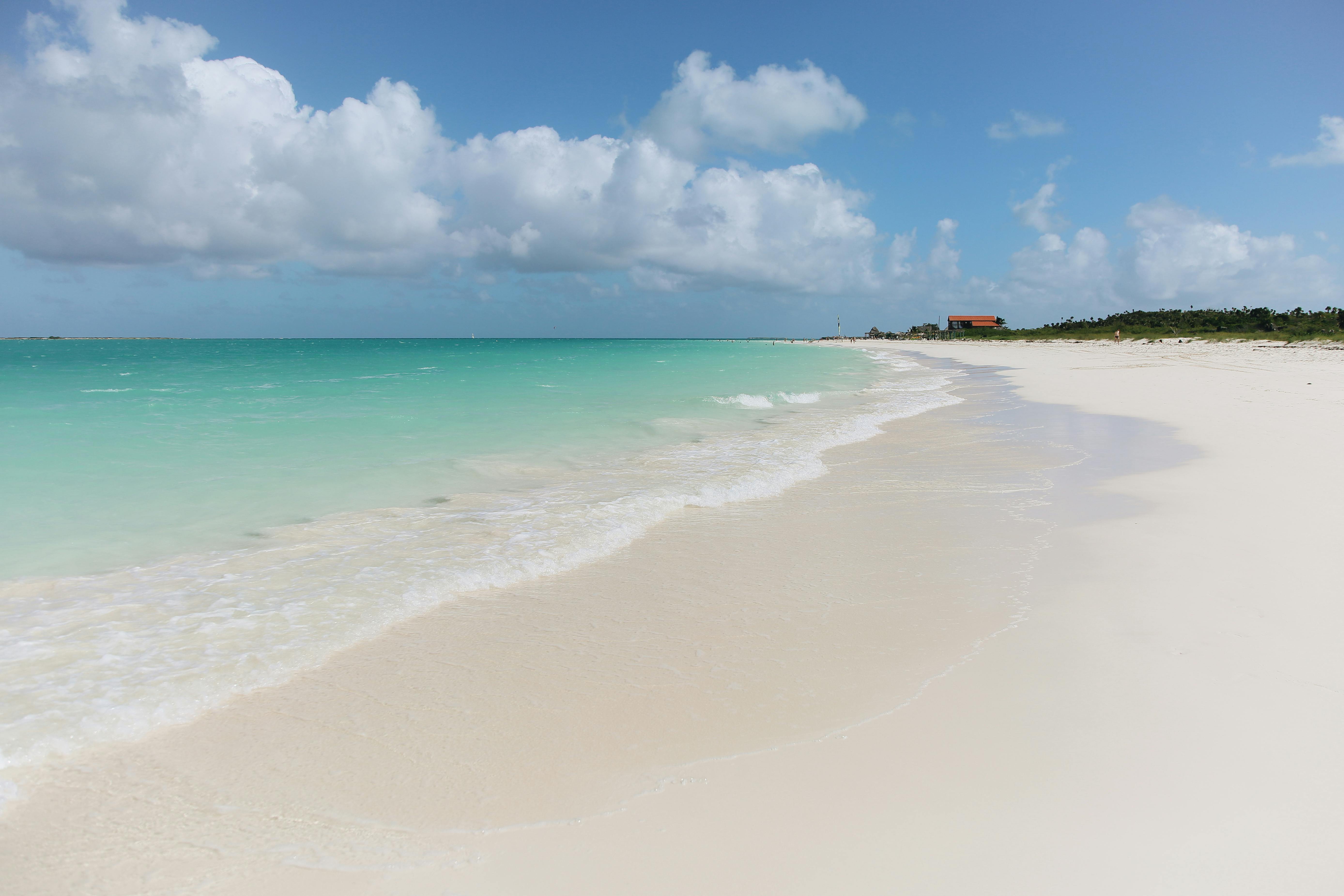 Sandy Beach and Turquoise Sea · Free Stock Photo