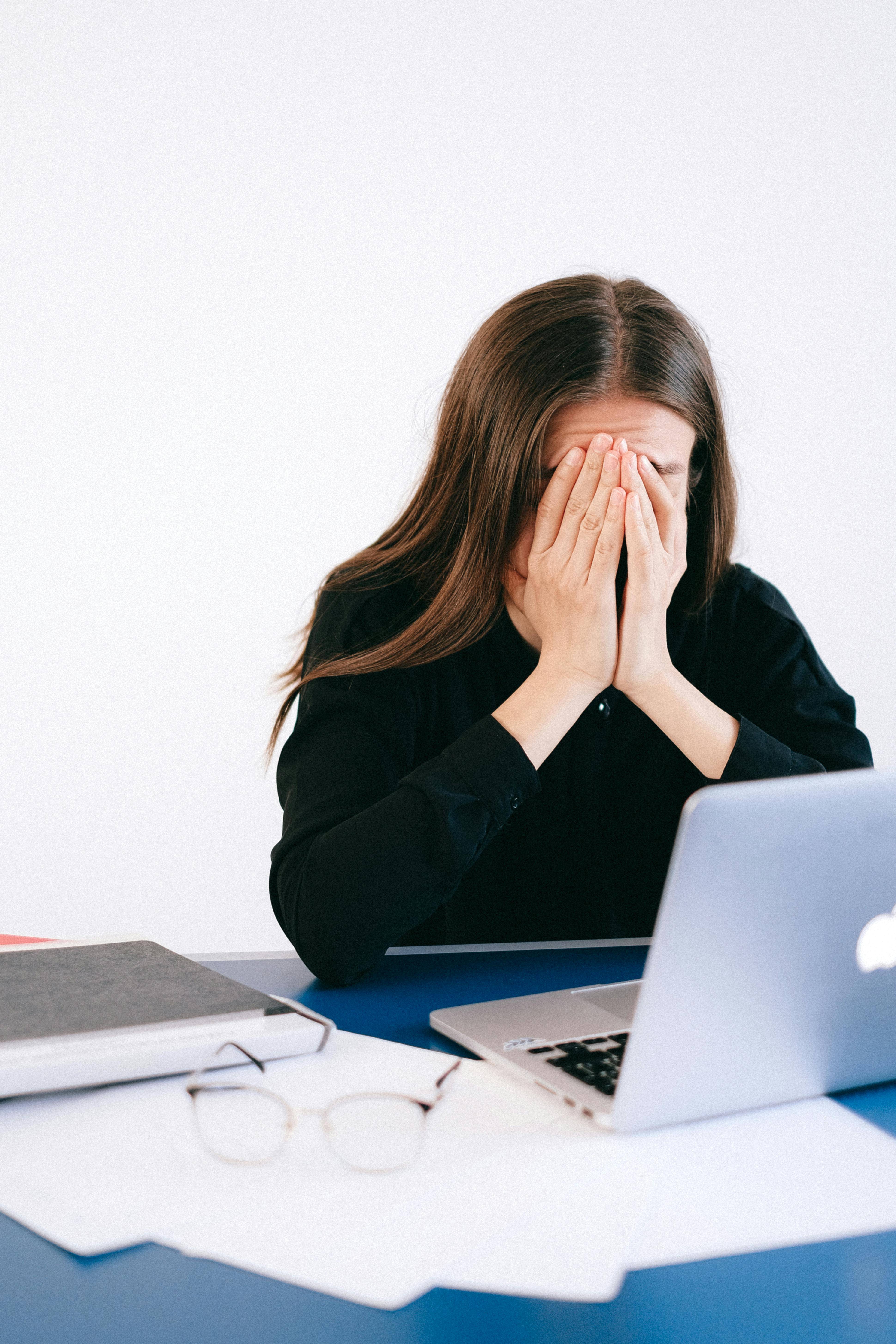 Stressed Woman Covering her Face with her Hands · Free Stock Photo