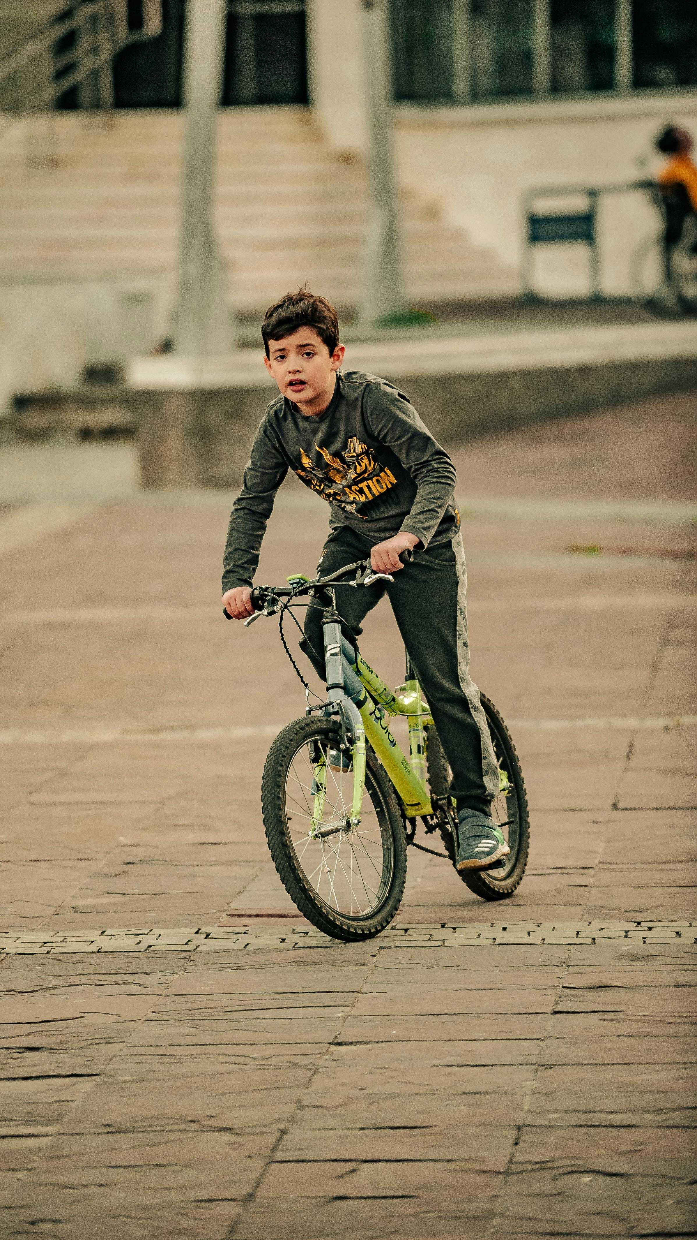 Boy Riding Bike at Daytime · Free Stock Photo