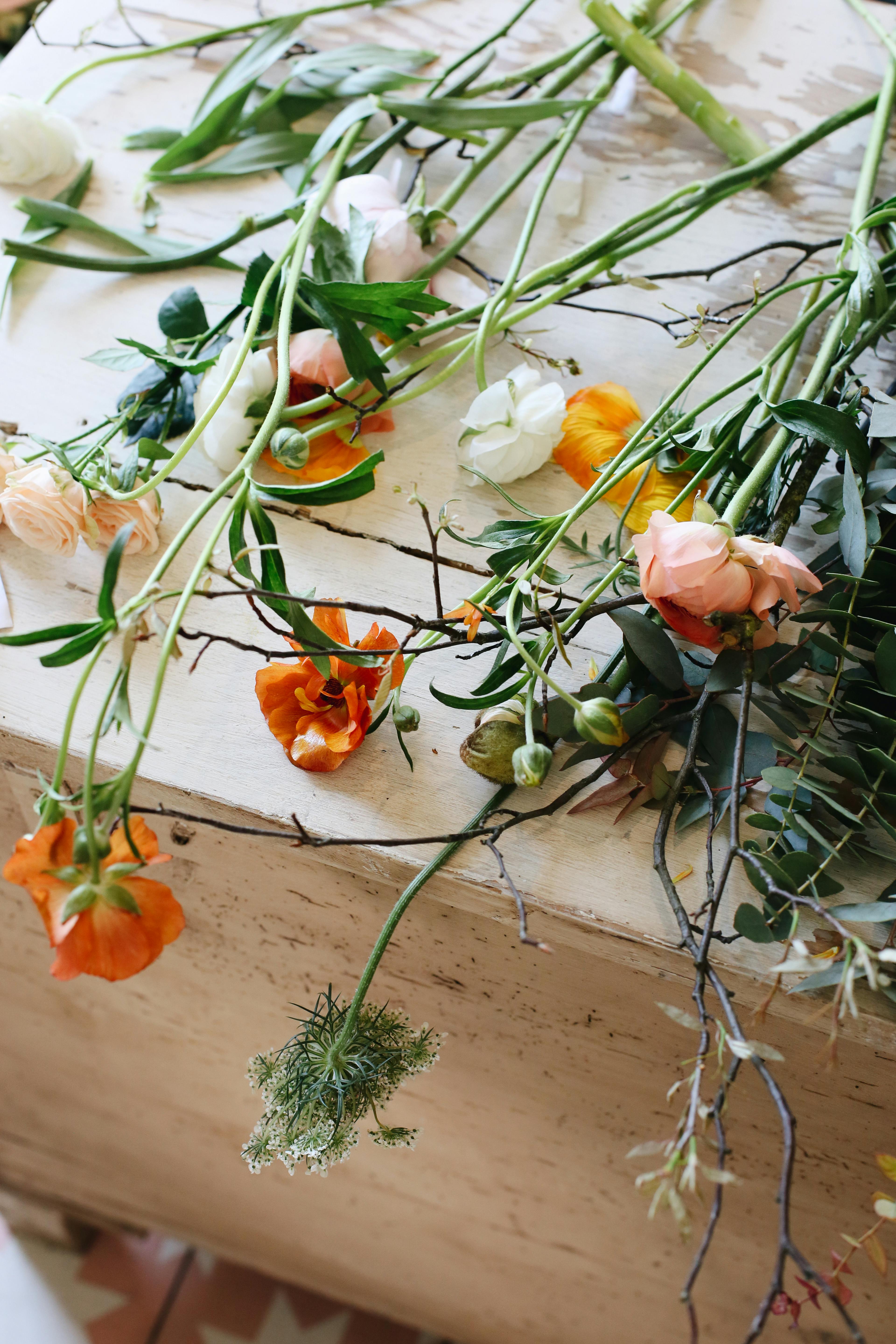 Close Up of Flowers on Table · Free Stock Photo