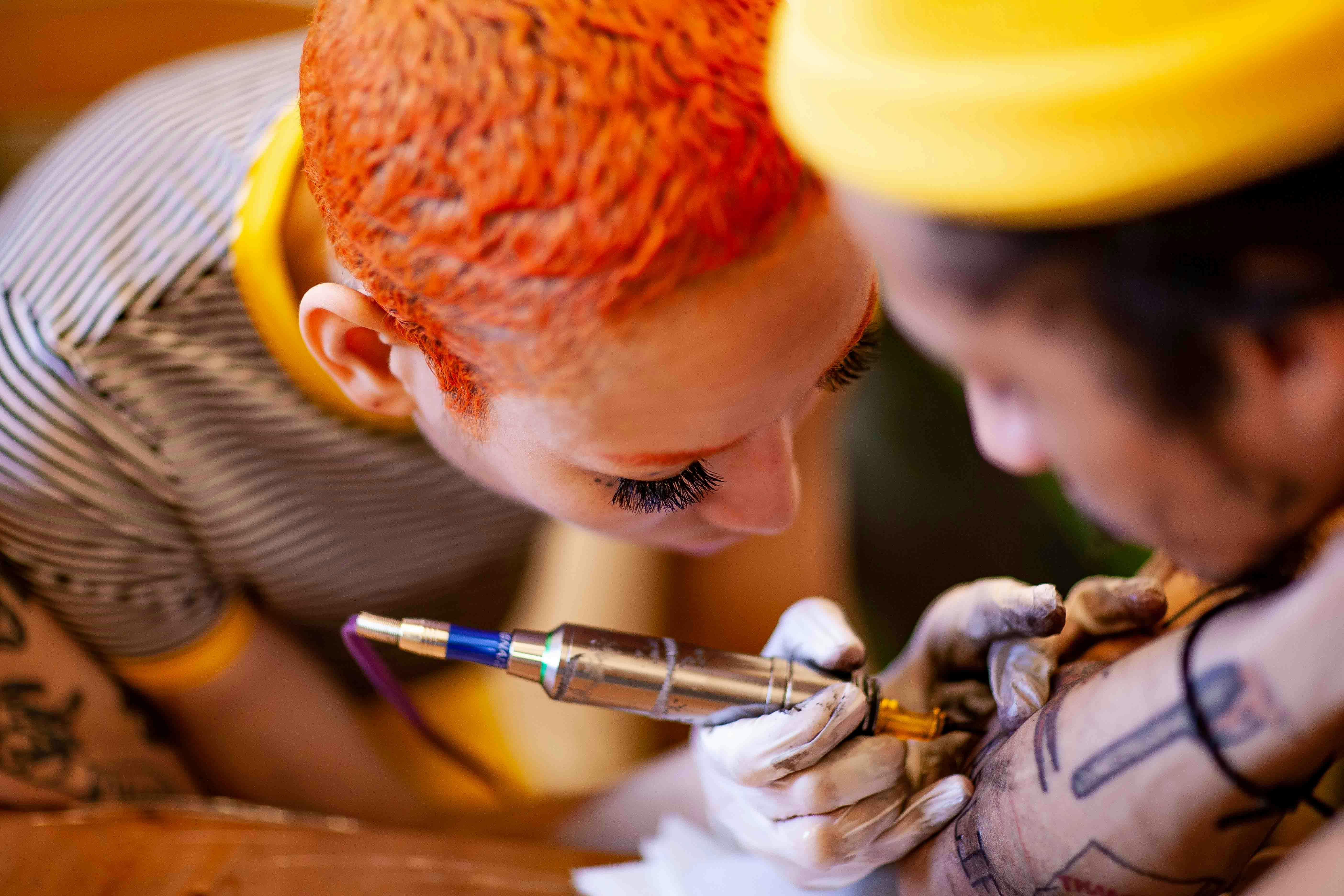 Close-Up Shot of Person Getting a Tattoo · Free Stock Photo
