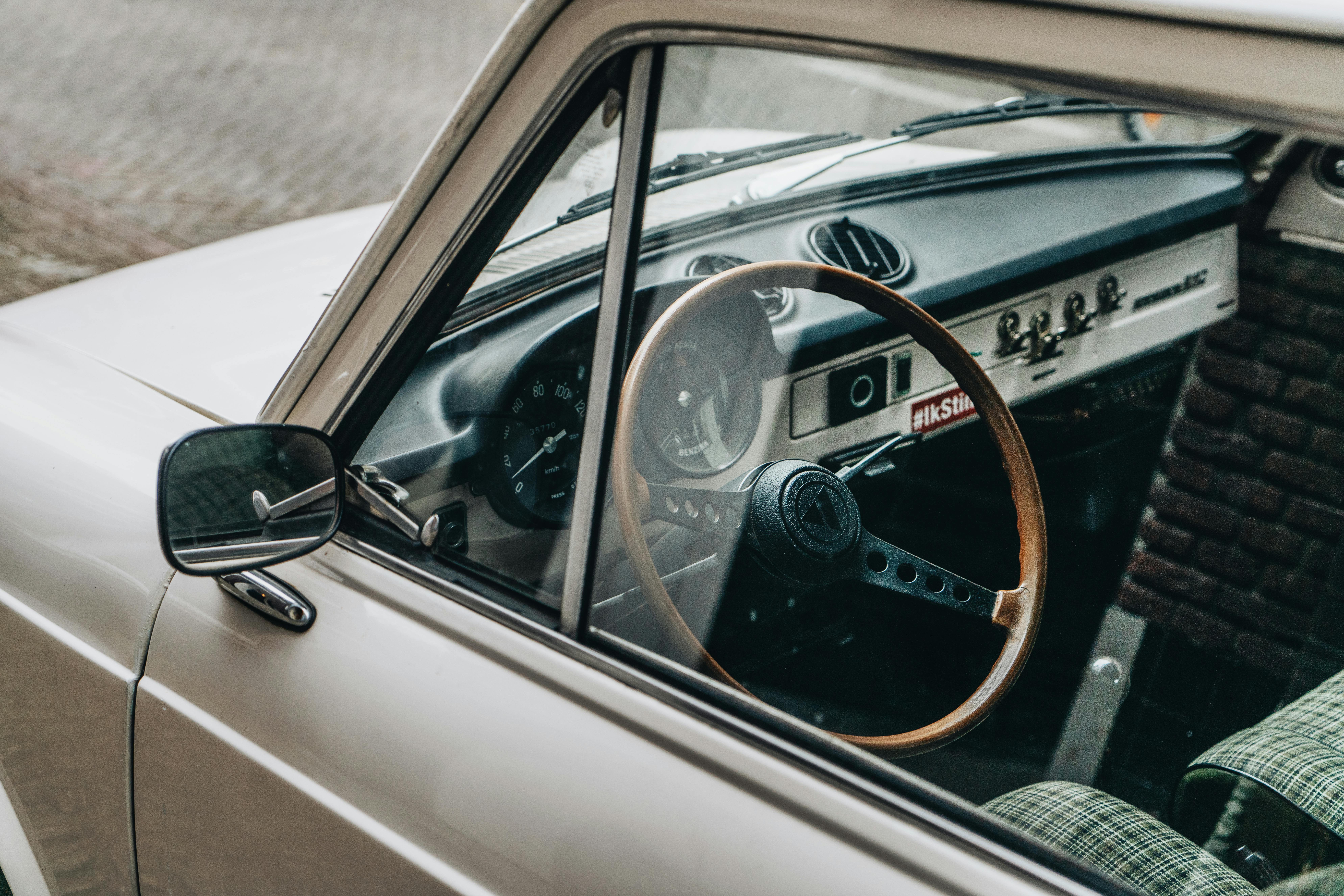 Through glass interior of retro car · Free Stock Photo