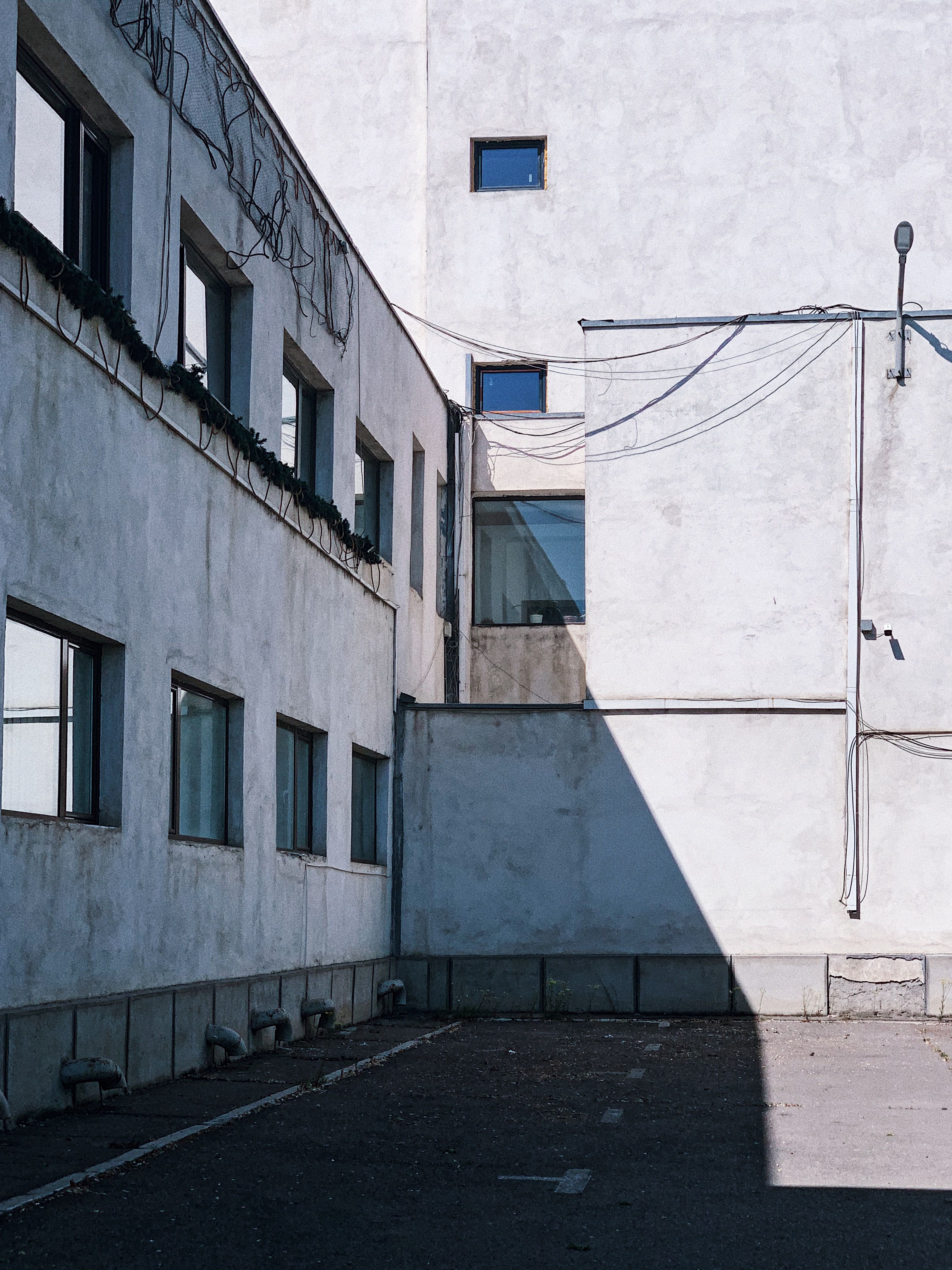 Old metal public payphone hanging on shabby wall · Free Stock Photo