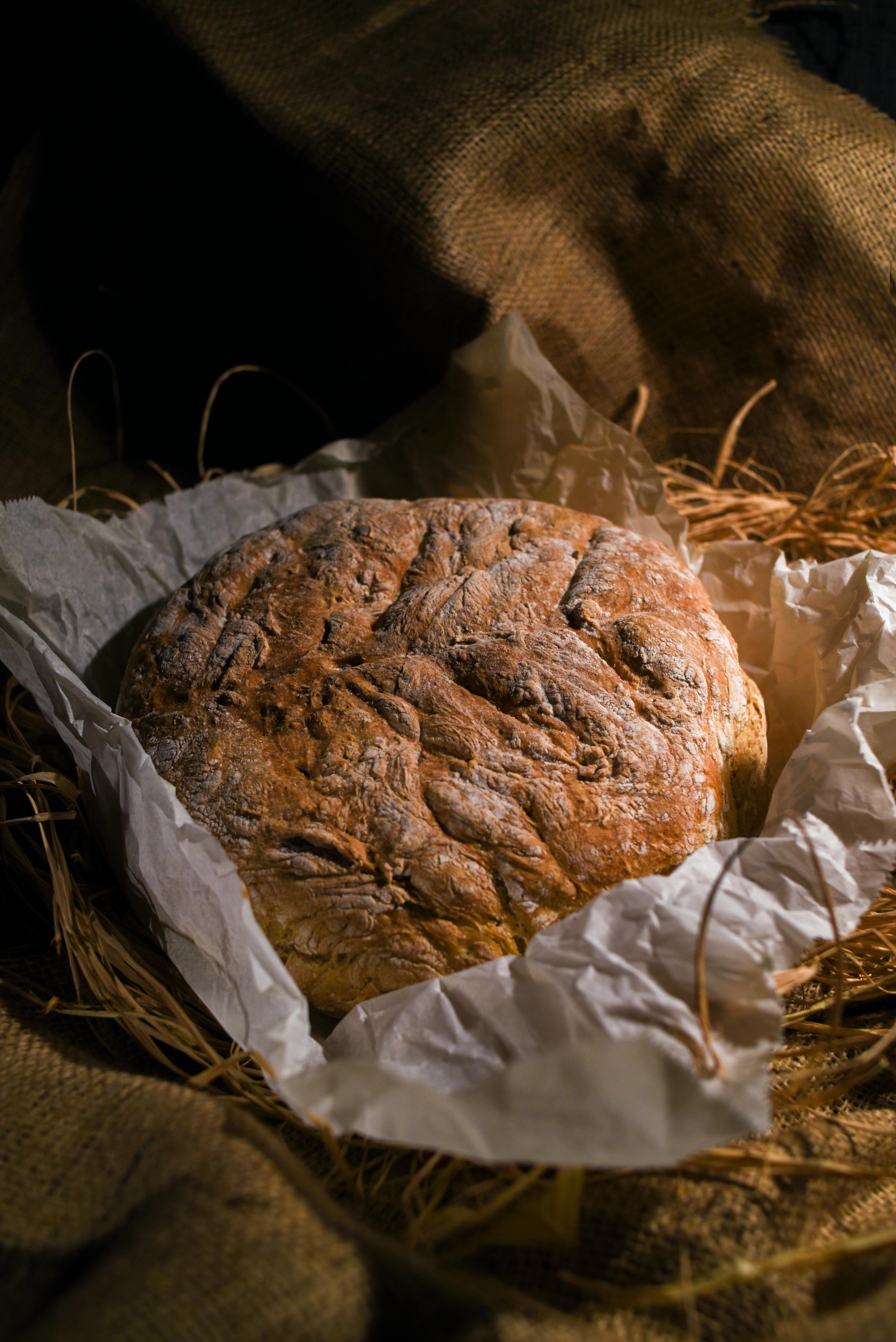 A Person Touching the Bread · Free Stock Photo
