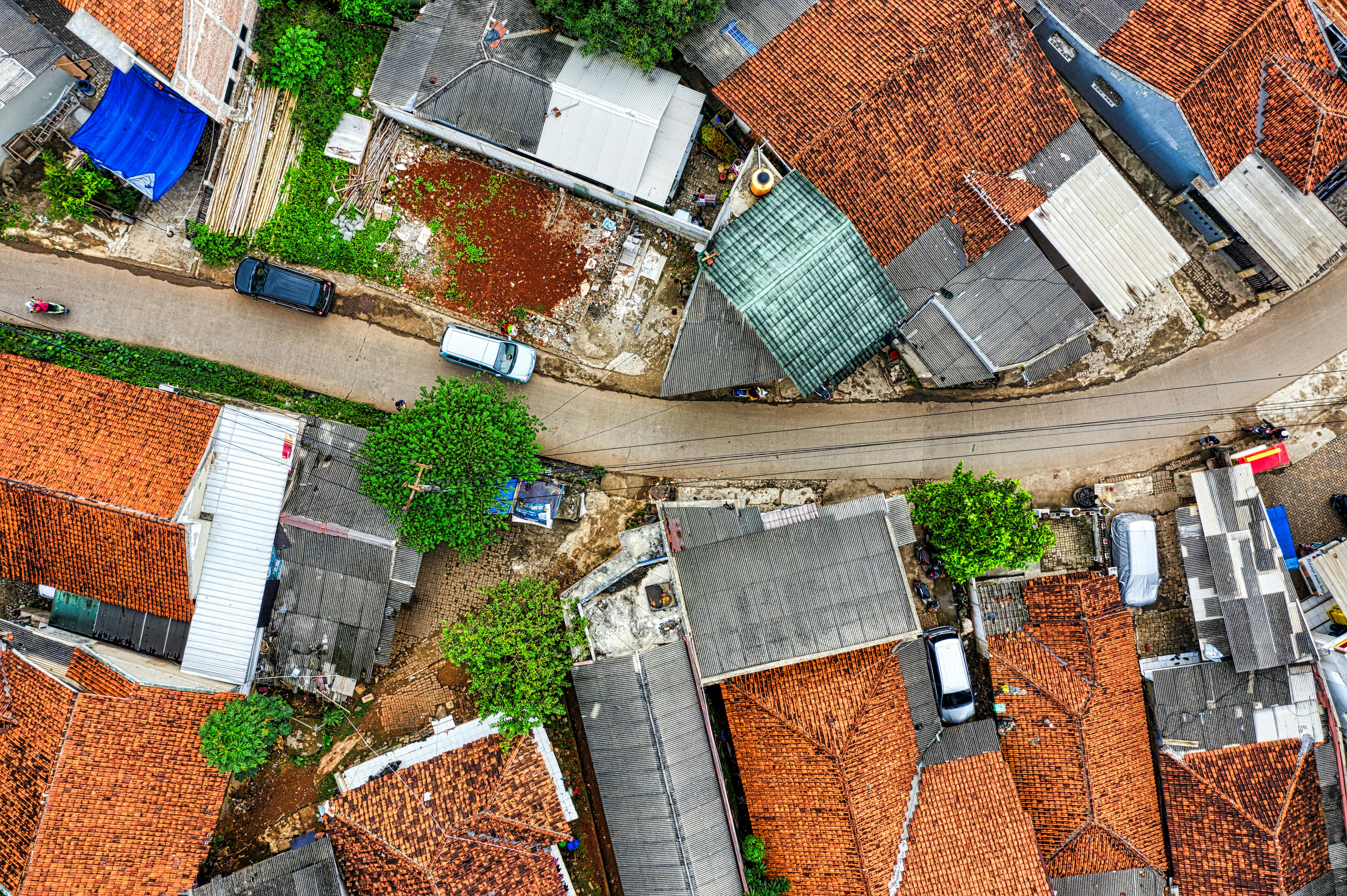 Aerial Photography of Roofs of Houses on a Small Town · Free Stock Photo