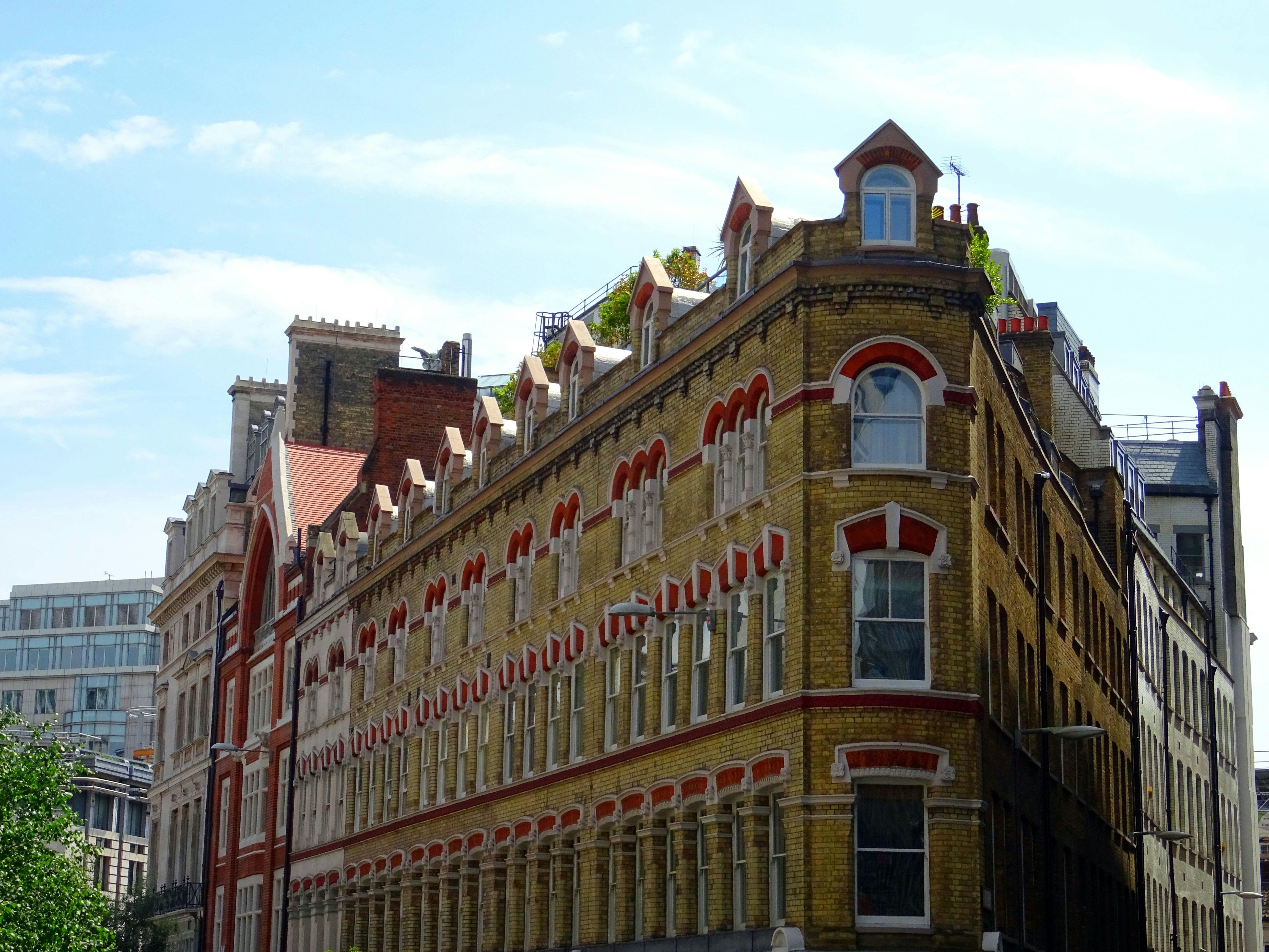 Yellow and Red Painted Building · Free Stock Photo