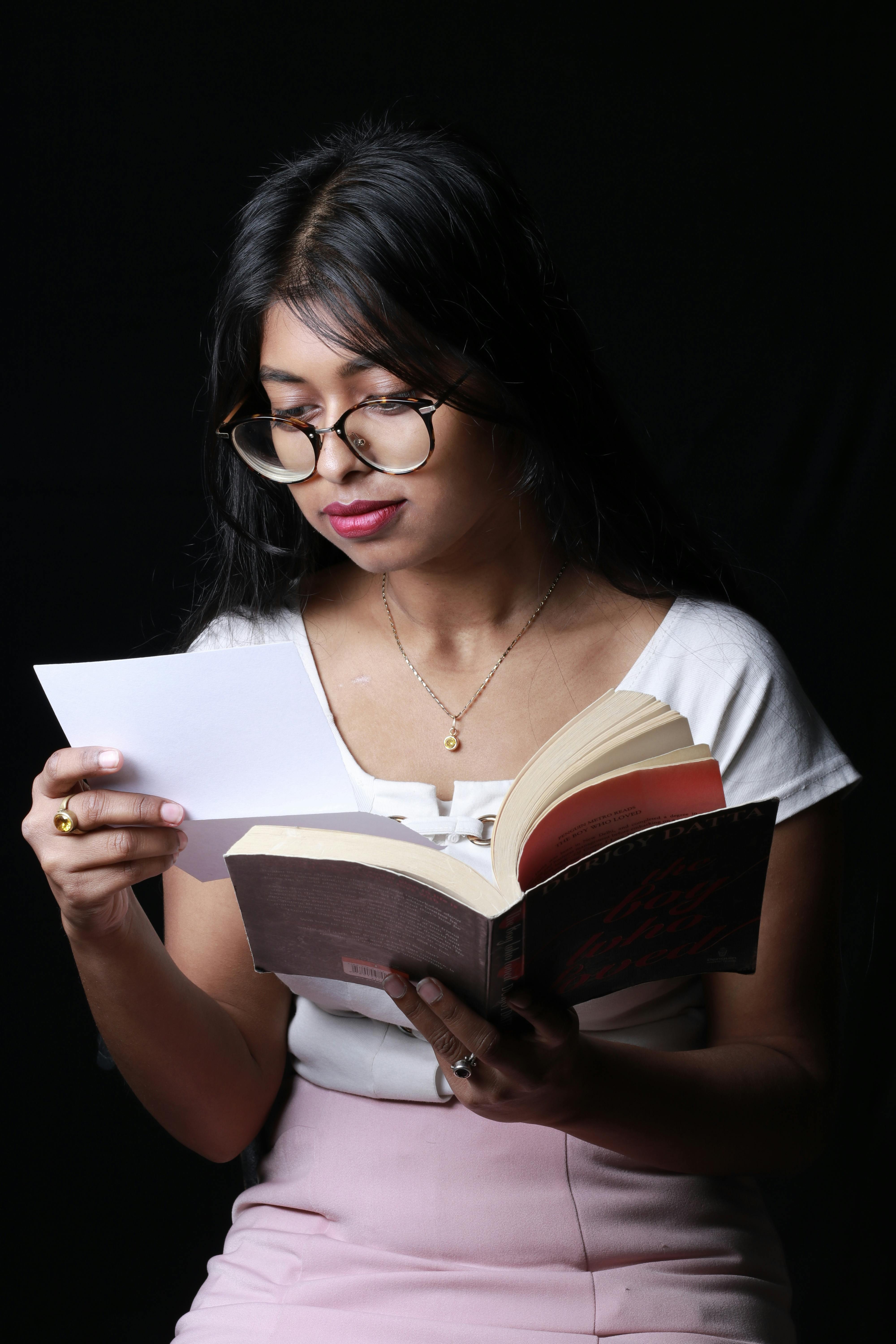 Selective Focus Photo of Woman Reading Book · Free Stock Photo