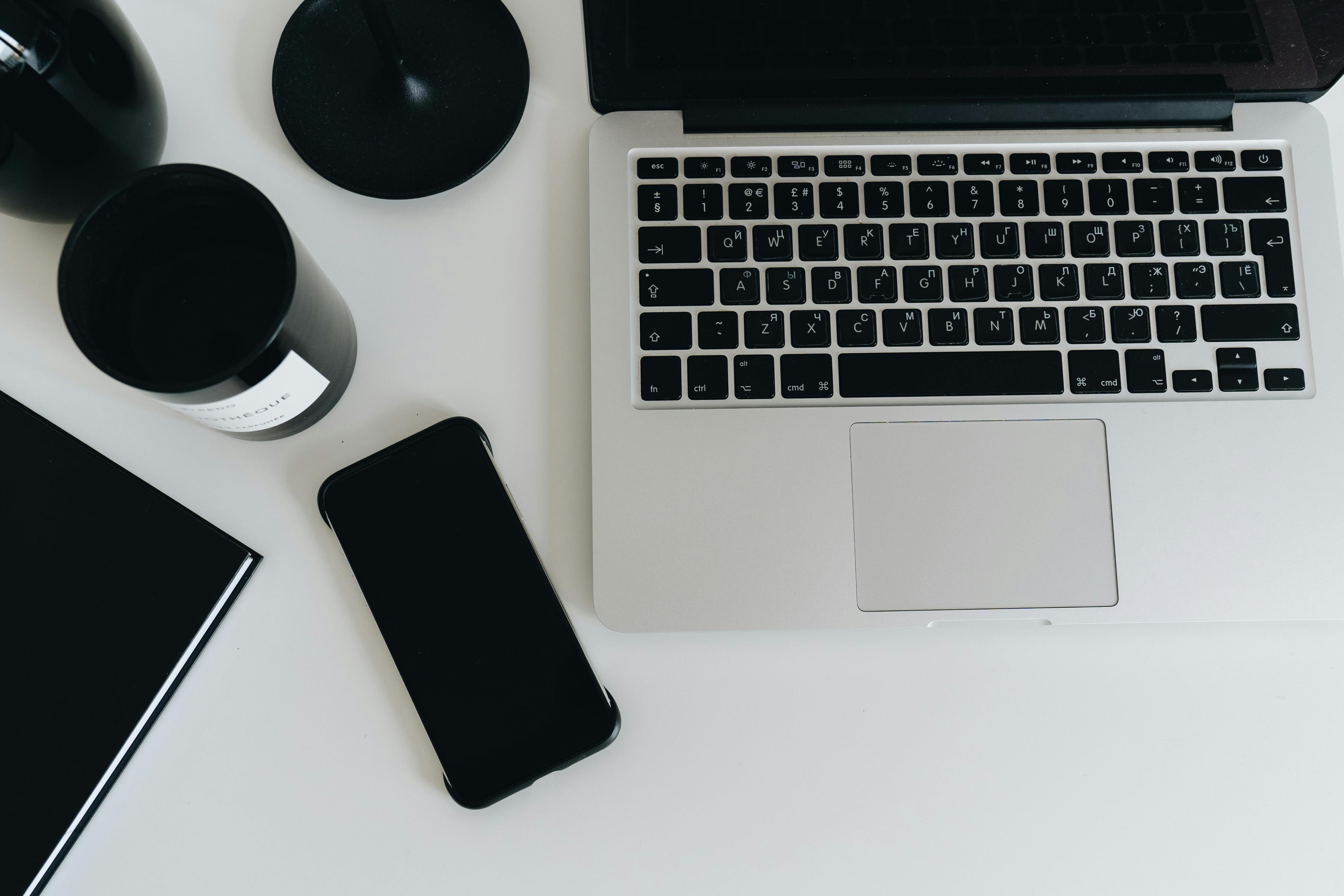 A Smartphone beside a Laptop · Free Stock Photo