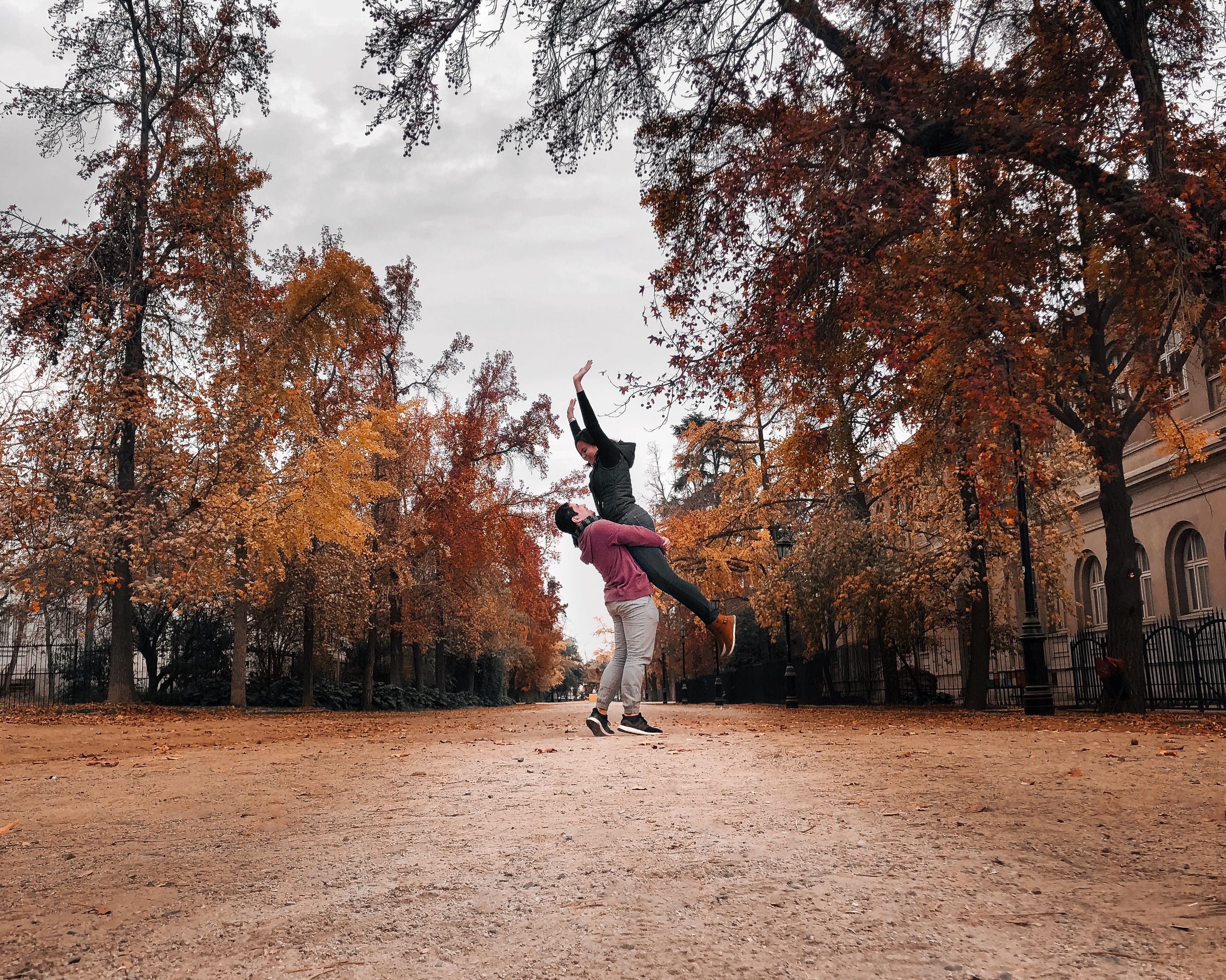Photo of Man Lifting a Woman · Free Stock Photo