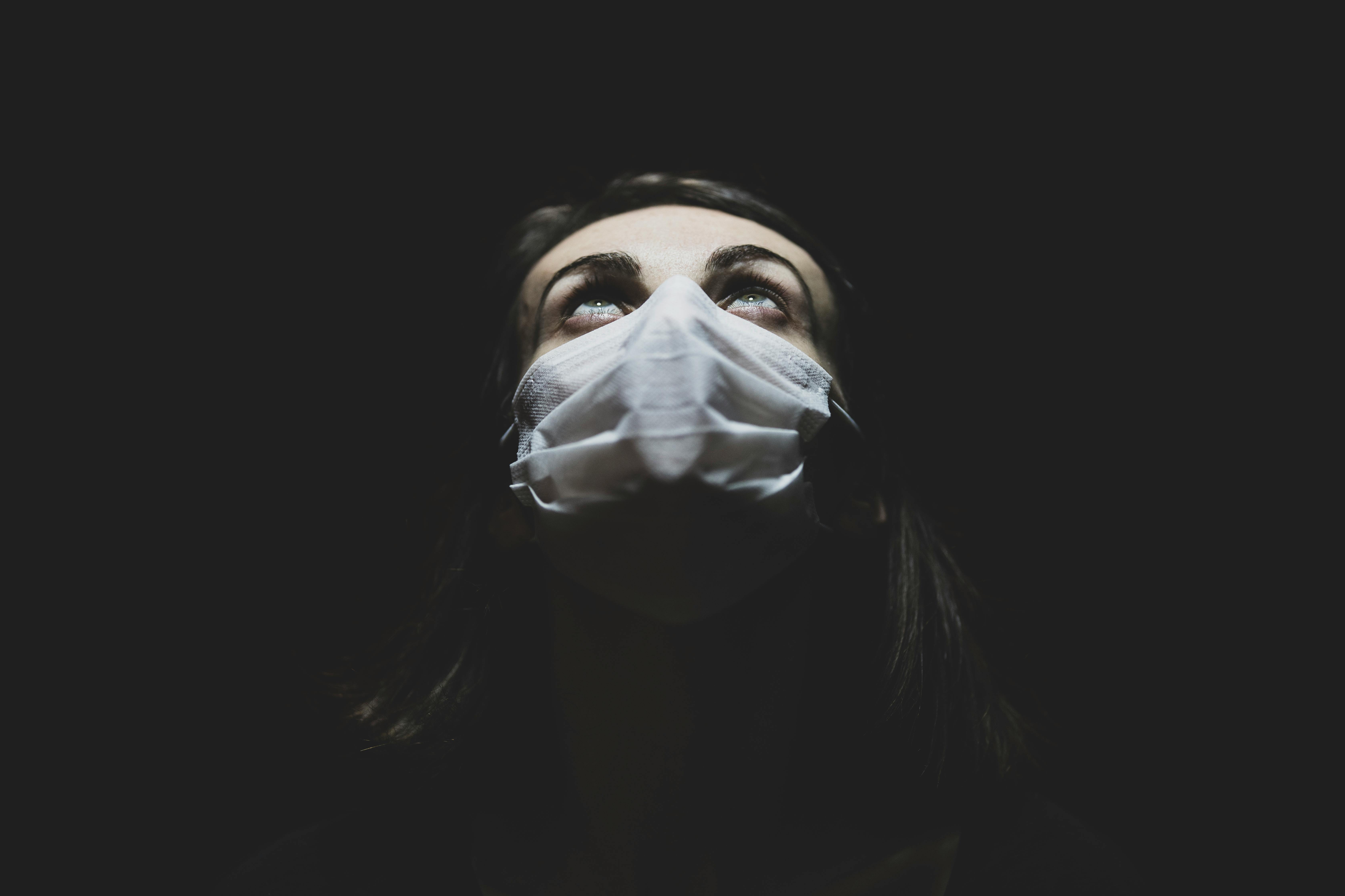People in Face Masks Waving Flags · Free Stock Photo