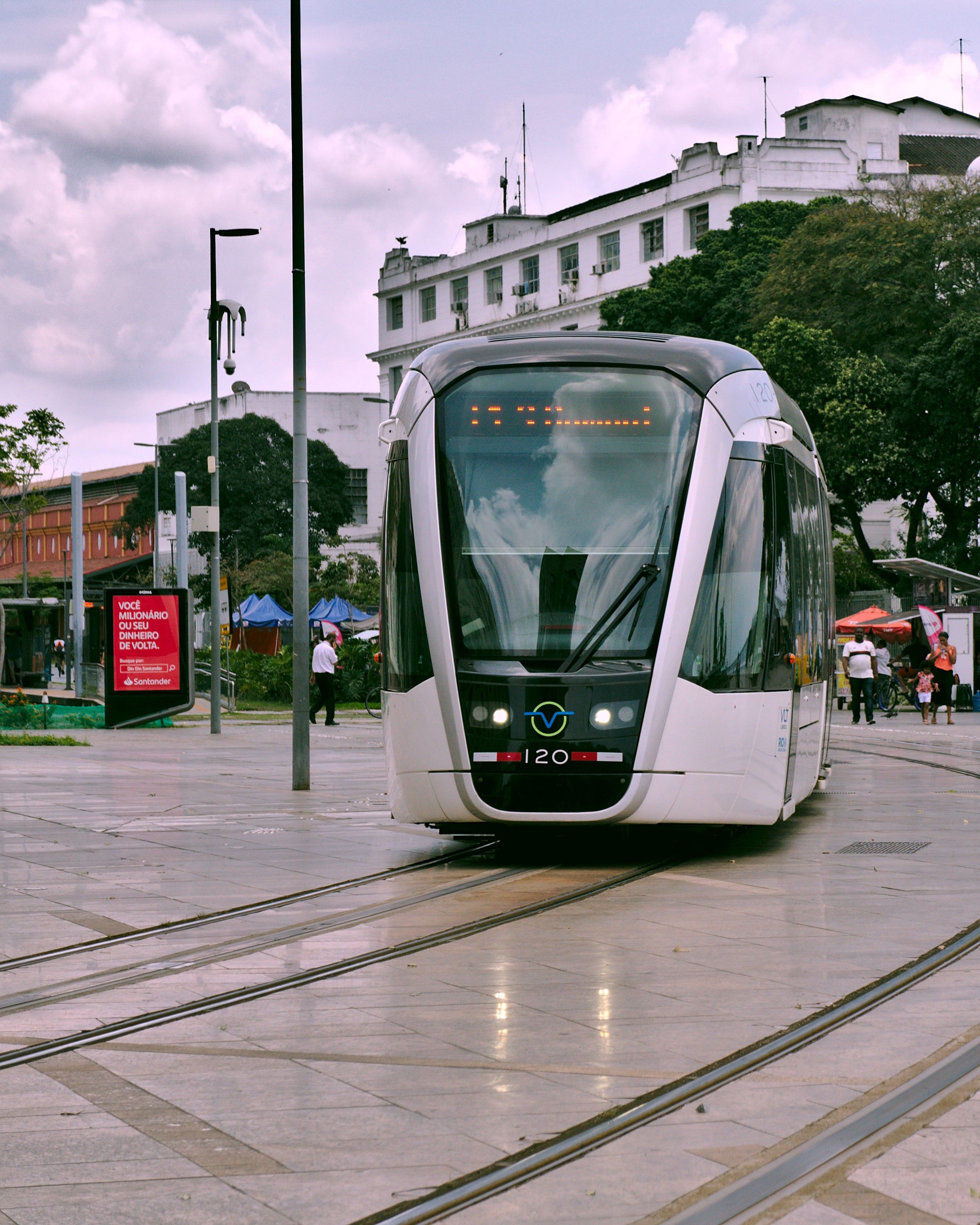 A Blue Tram on the Road · Free Stock Photo