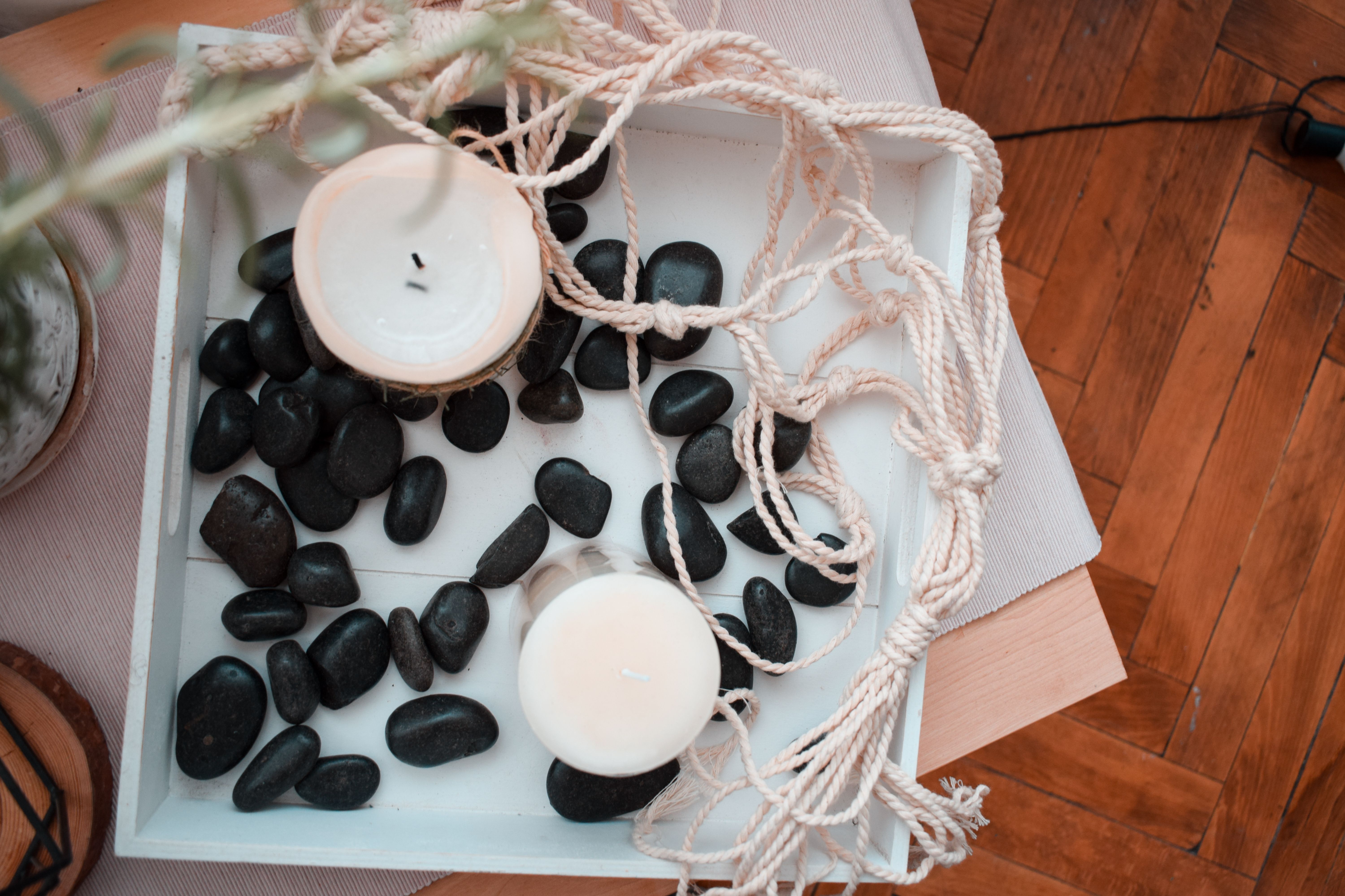 Set of colorful semiprecious stones placed chaotically on gray tabletop ...