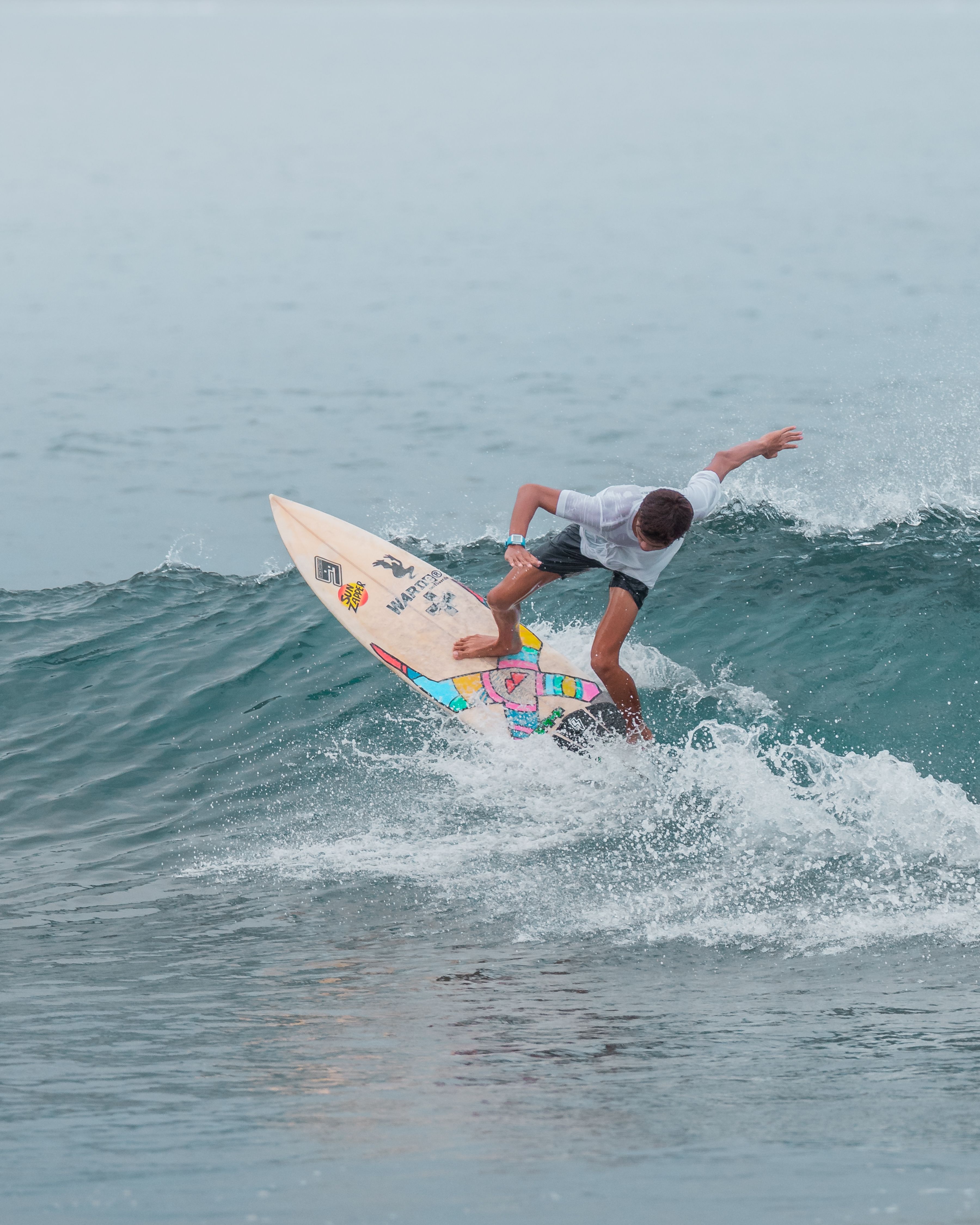 Person Surfing on Sea Waves · Free Stock Photo