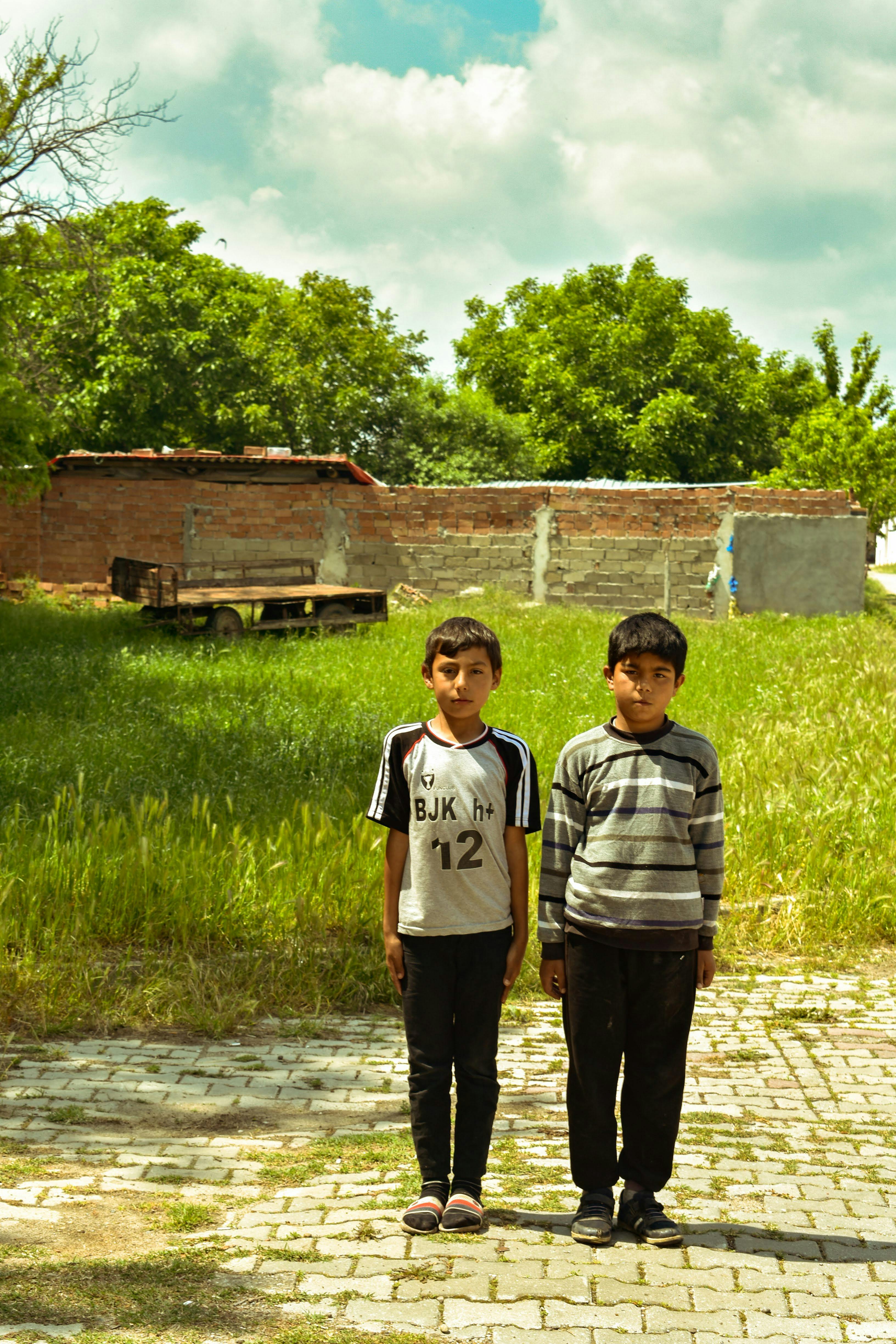 Two Boys Standing Together · Free Stock Photo