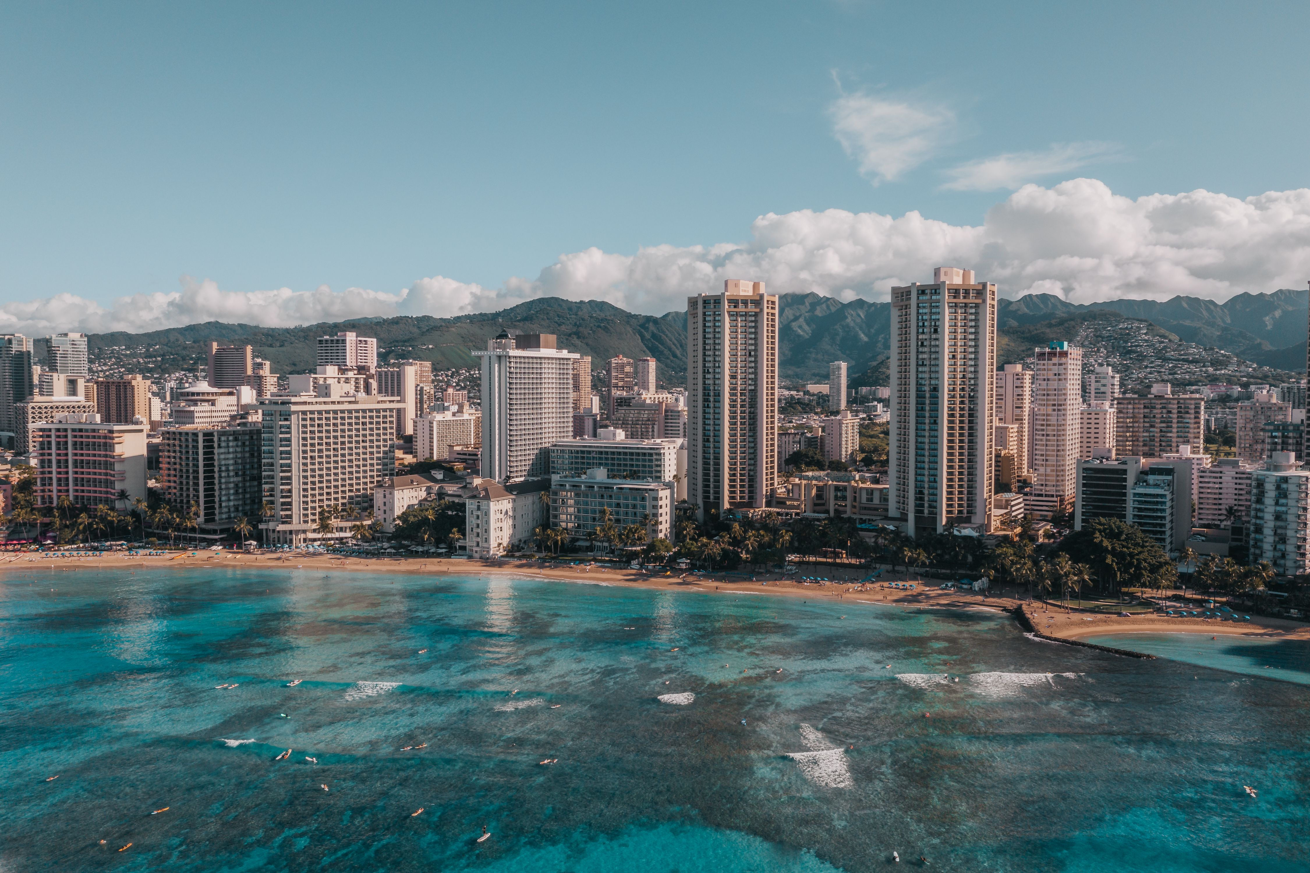 City Buildings Near the Ocean · Free Stock Photo
