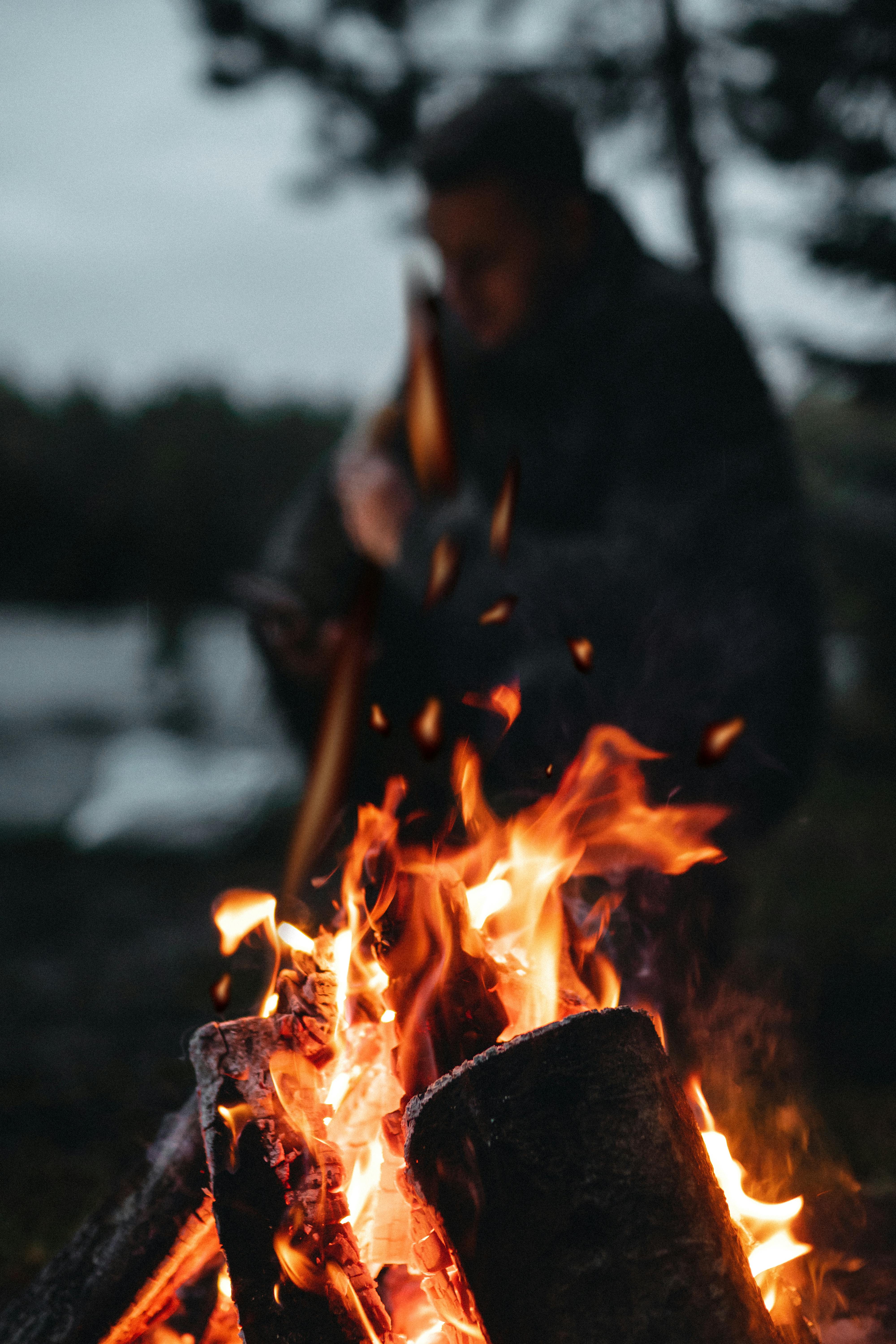 Two People Making fire · Free Stock Photo