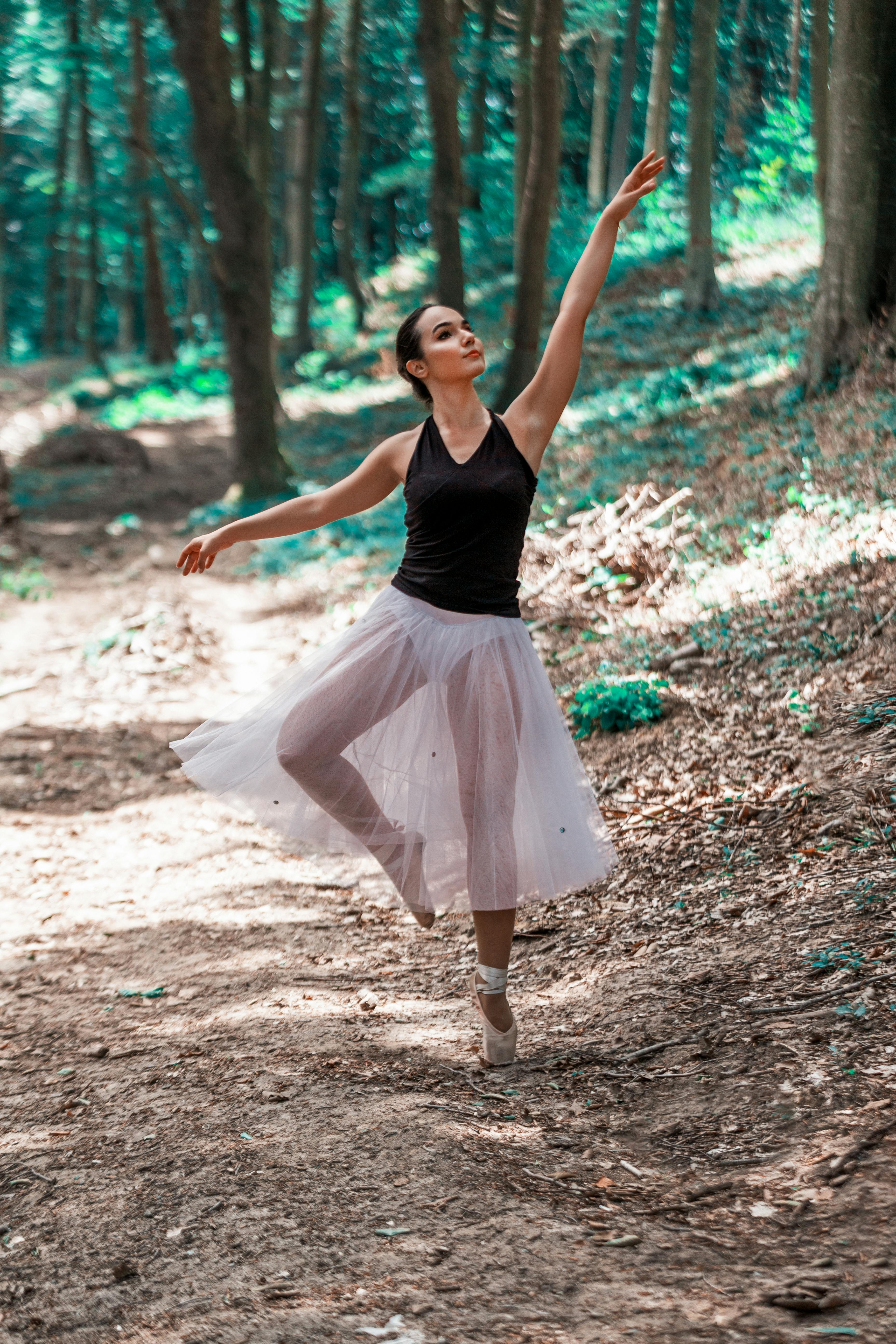 A Woman Dancing Ballet in the Forest · Free Stock Photo