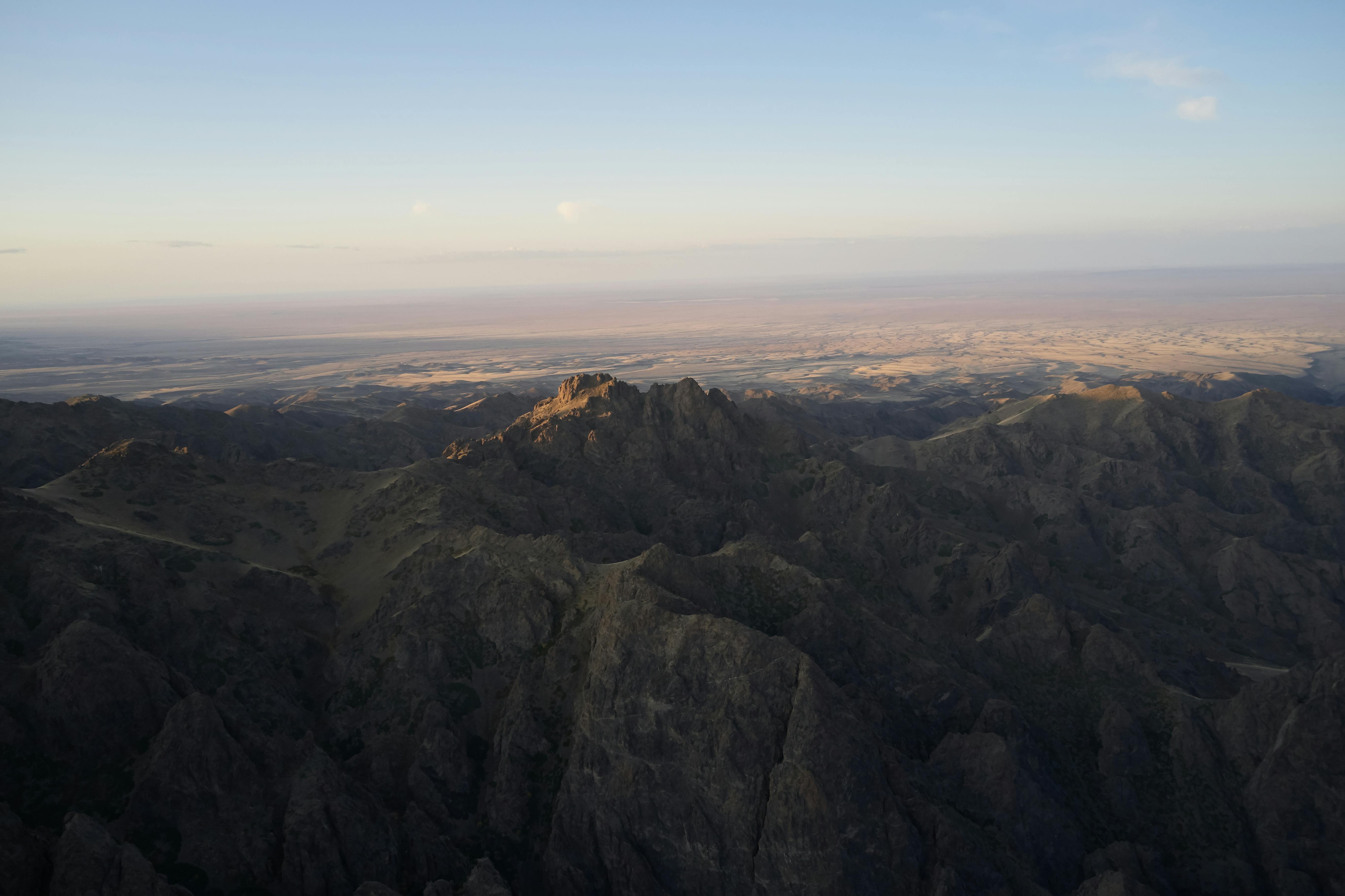 Landscape of dusky mountains with light hazy valley in distance · Free ...